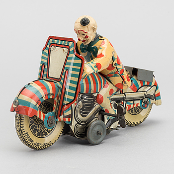 Mettoy Clown on Motorcycle, c. 1950. - Bukowskis