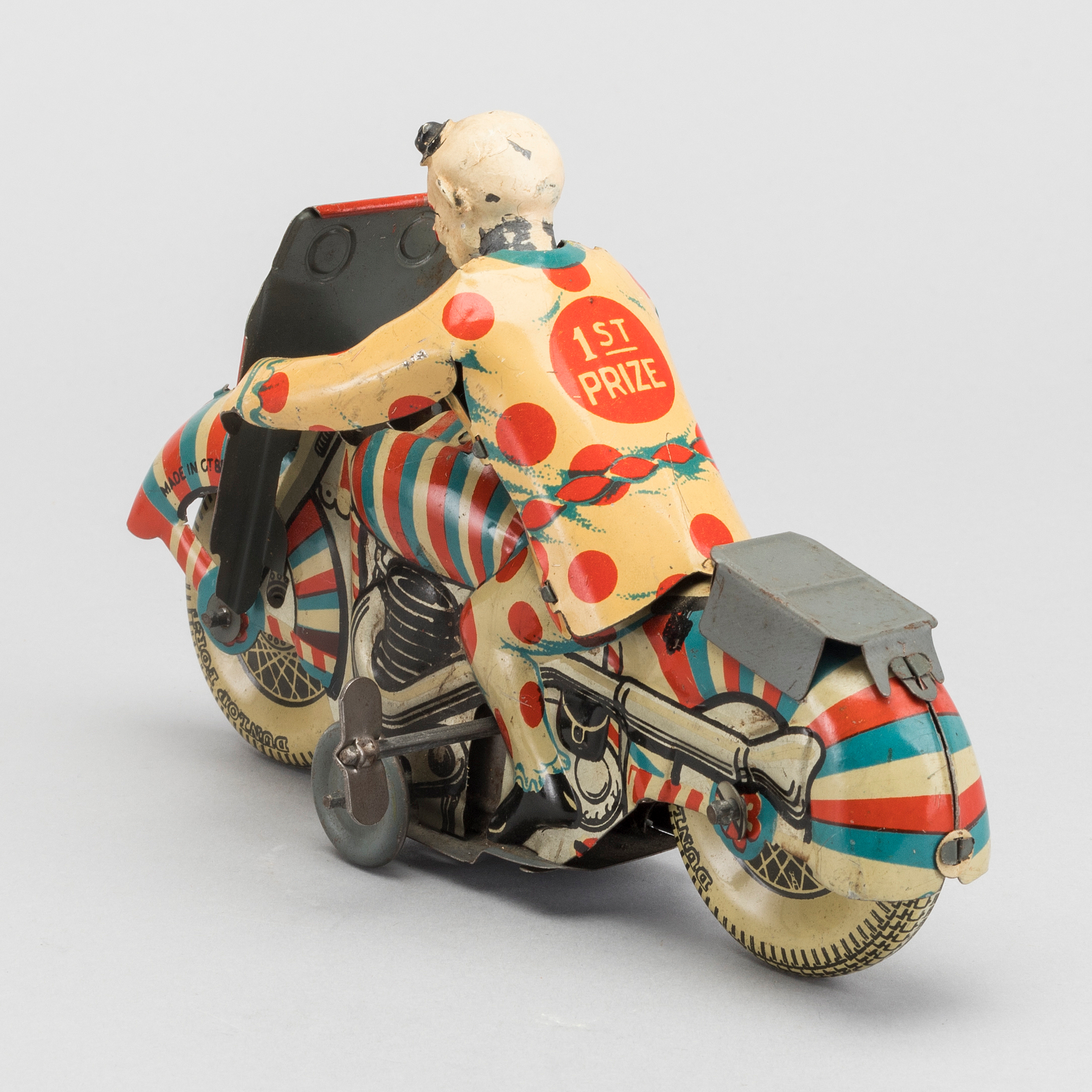 Mettoy Clown on Motorcycle, c. 1950. - Bukowskis