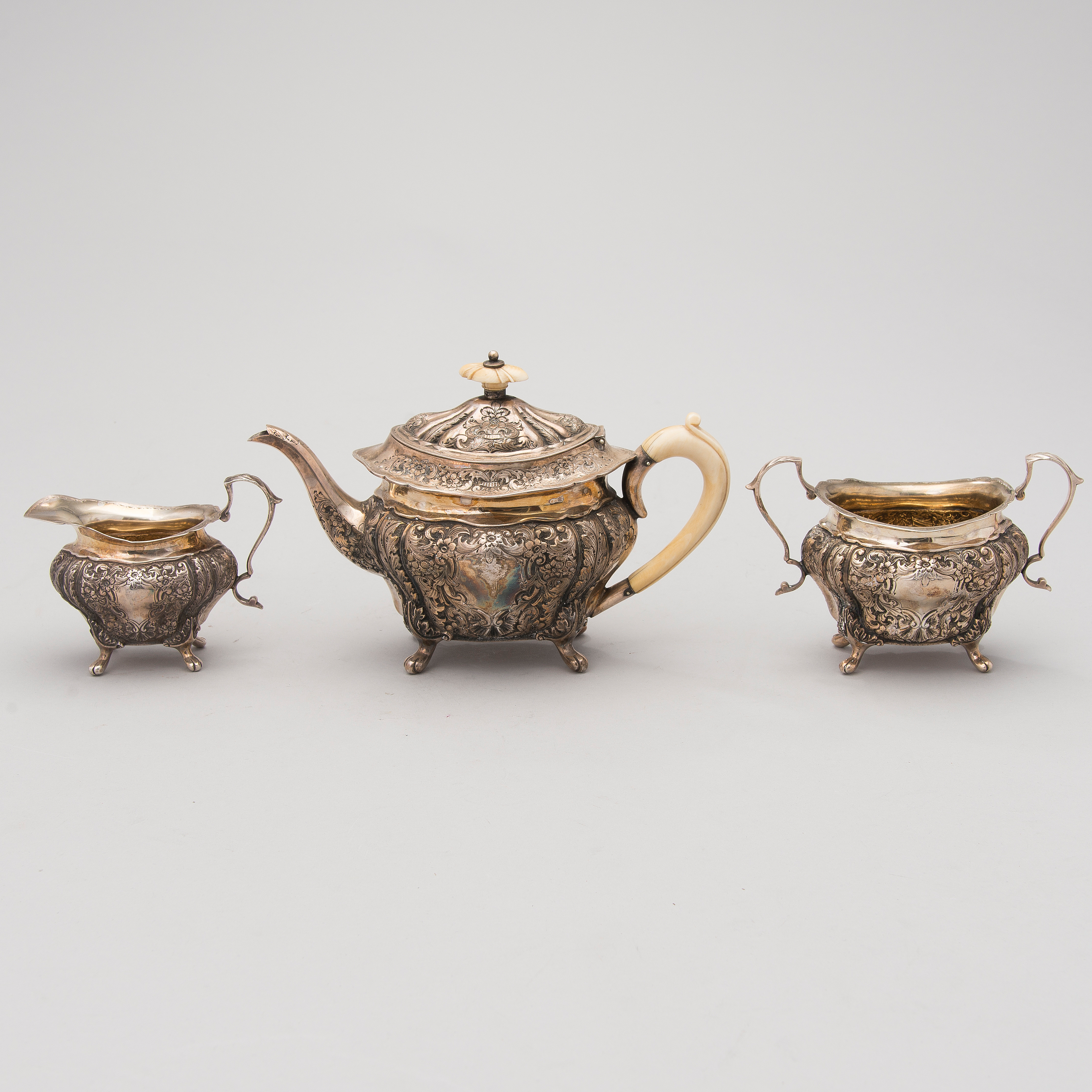 A three piece silver tea set, Albert Henry Thompson, Sheffield, England ...