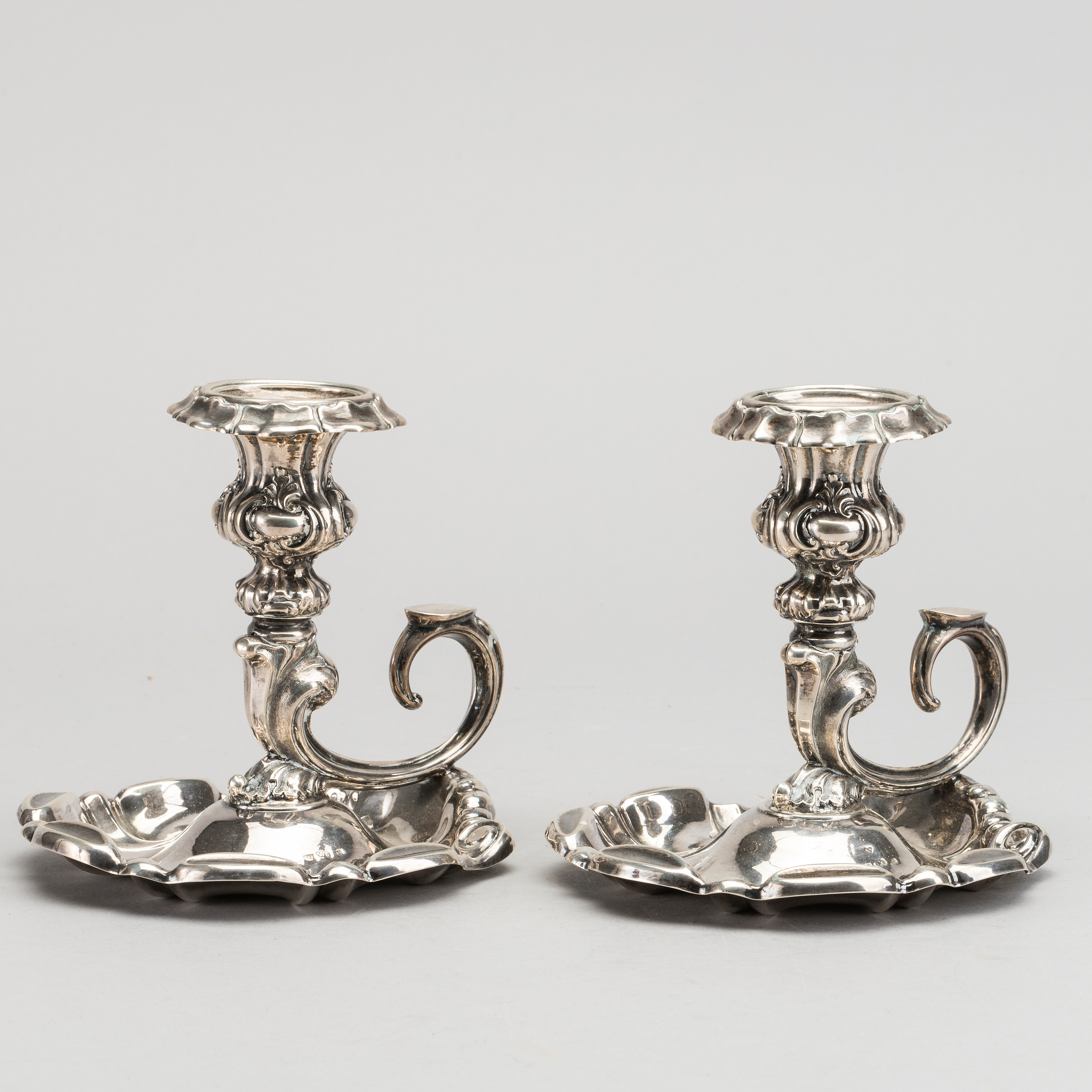 JOHAN OLOF ÖSTLUND, a pair of candlesticks Gävle 1862. - Bukowskis
