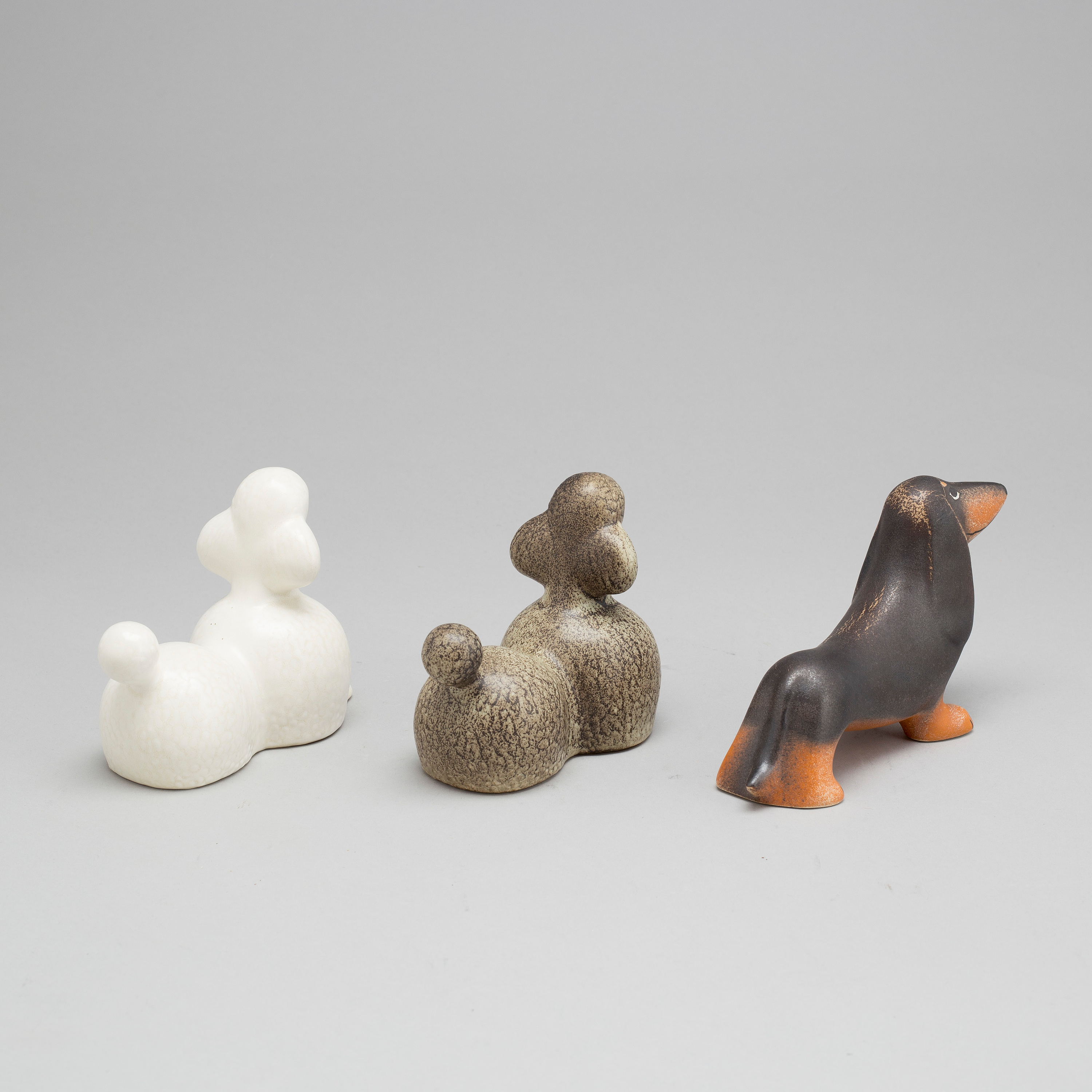 LISA LARSON, three stoneware sculptures, K-Studion, Gustavsberg 1995-96. - Bukowskis