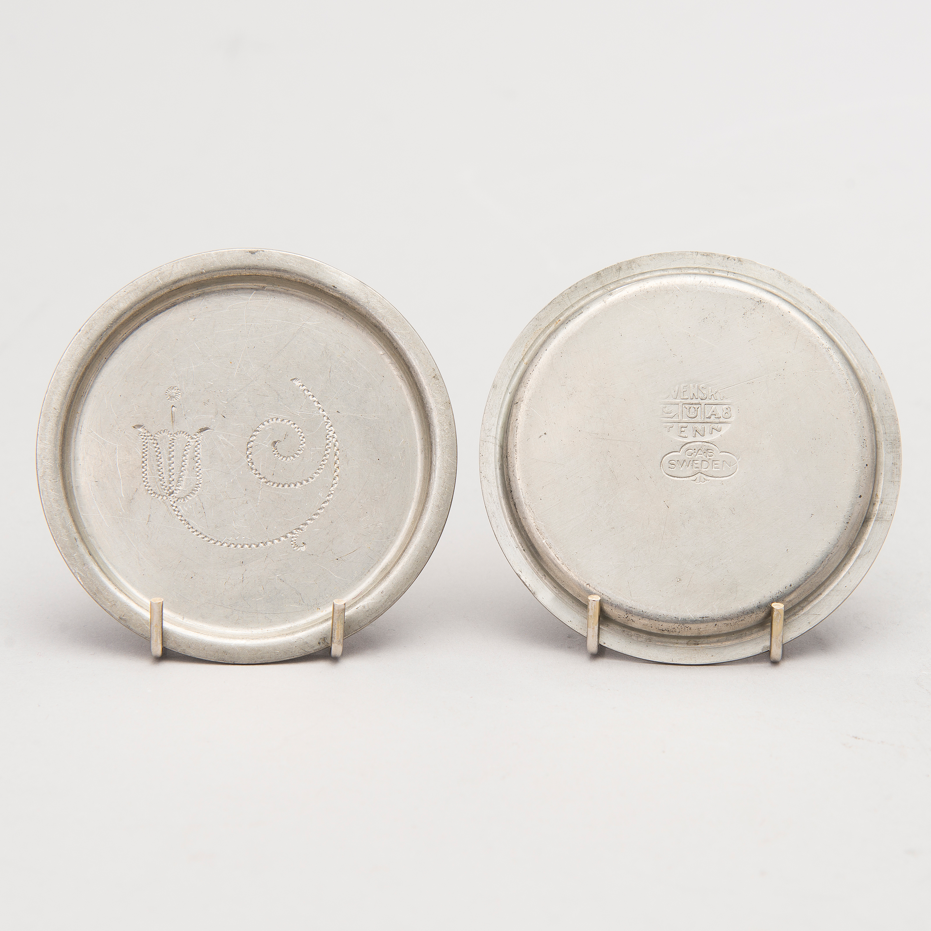 ten pewter coasters, marked Svenskt tenn, 1920/30s. - Bukowskis