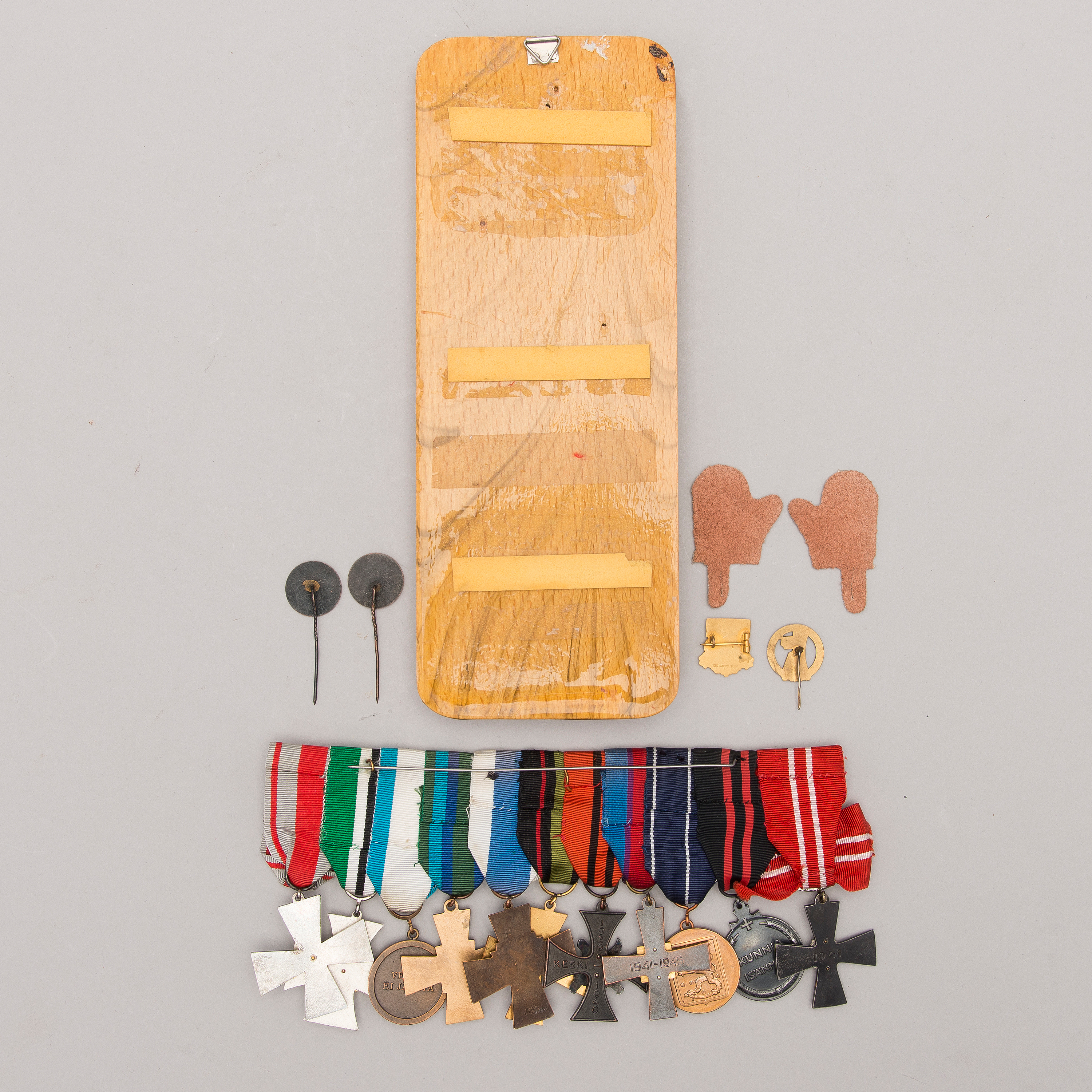 A set of Finnish badges and medals, first to second half of 20th ...