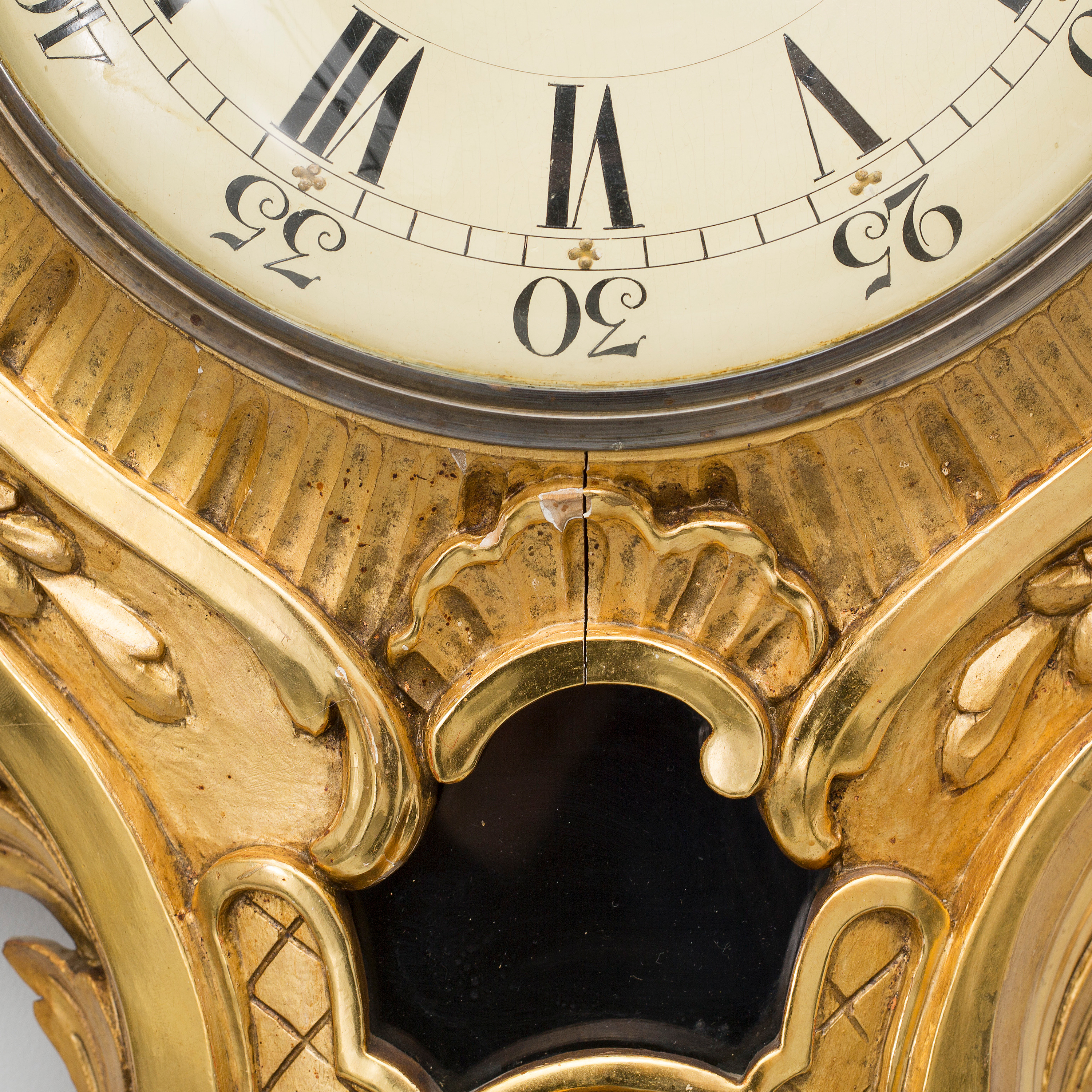 A rococo style wall clock, first half of the 20th century. - Bukowskis