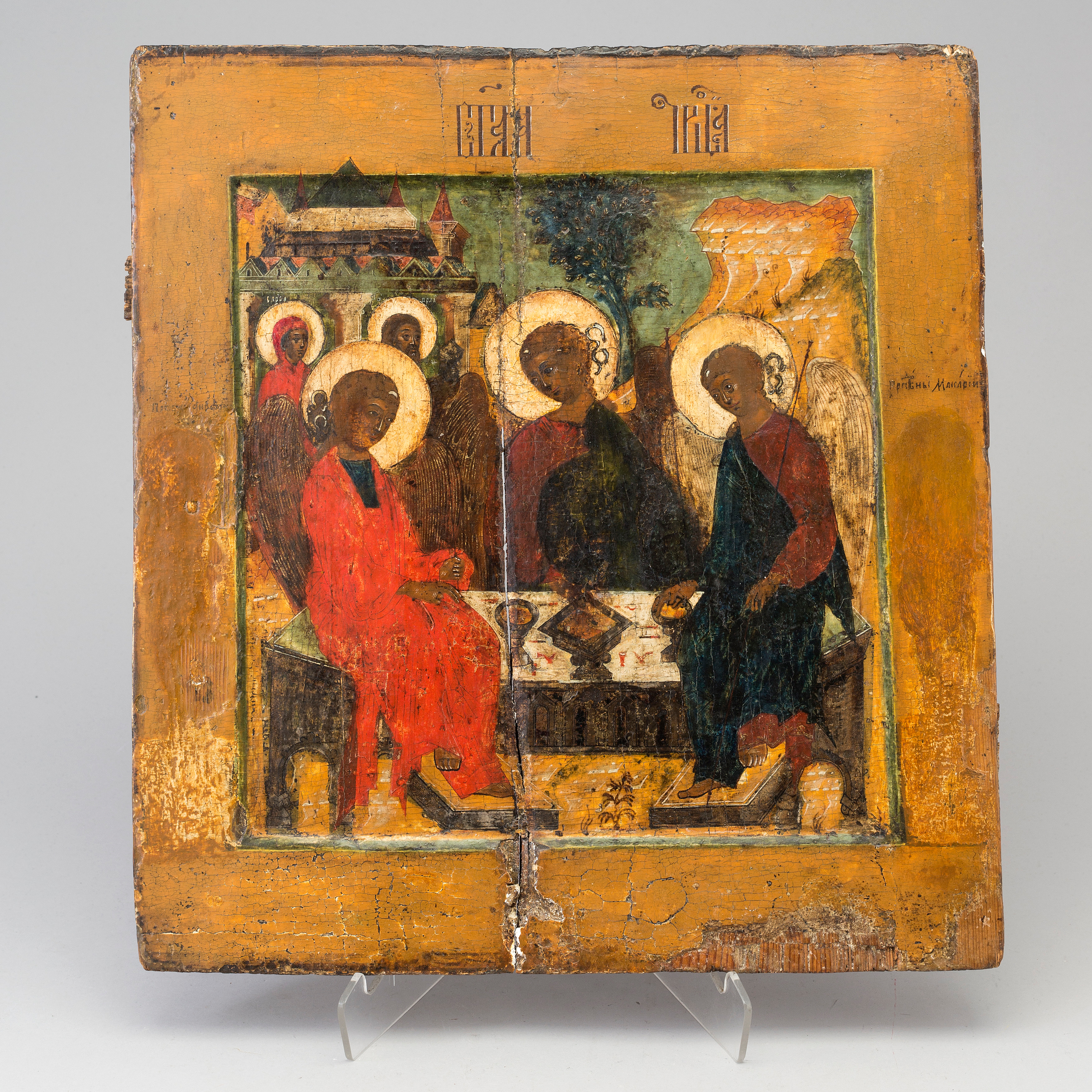 A Russian 19th century icon depicting the Holy Trinity, tempera on wood ...