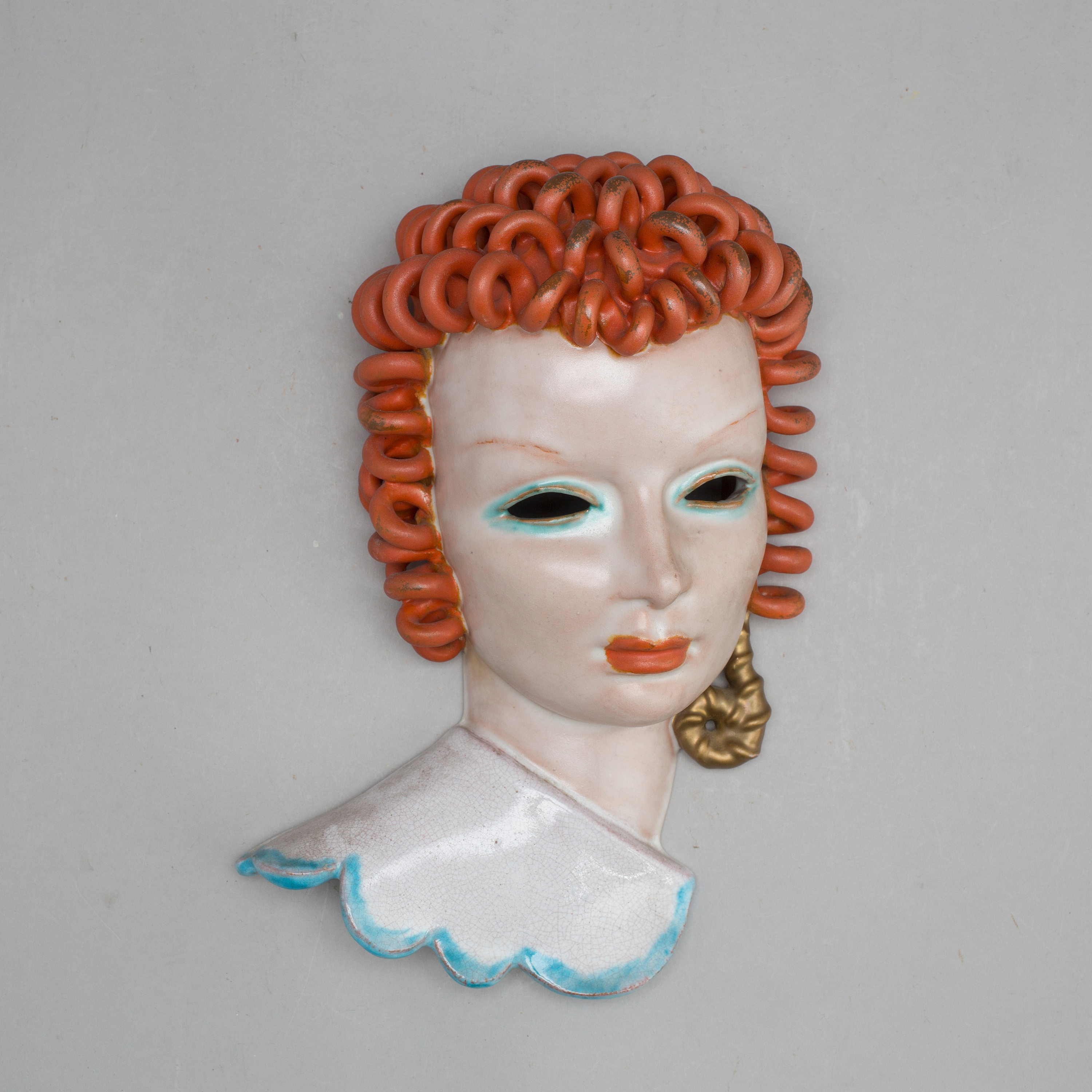 A glazed terracotta mask by Goldscheider, Austria, 20th century ...