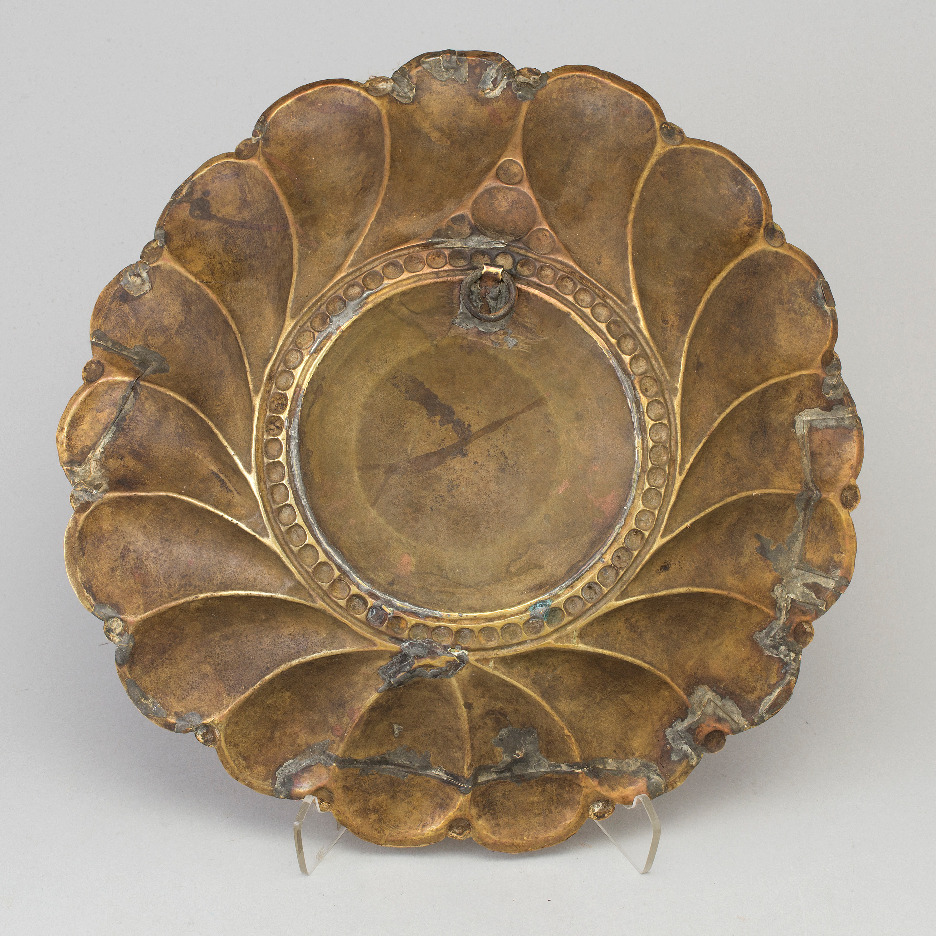 A 17th century brass wall plaque. - Bukowskis