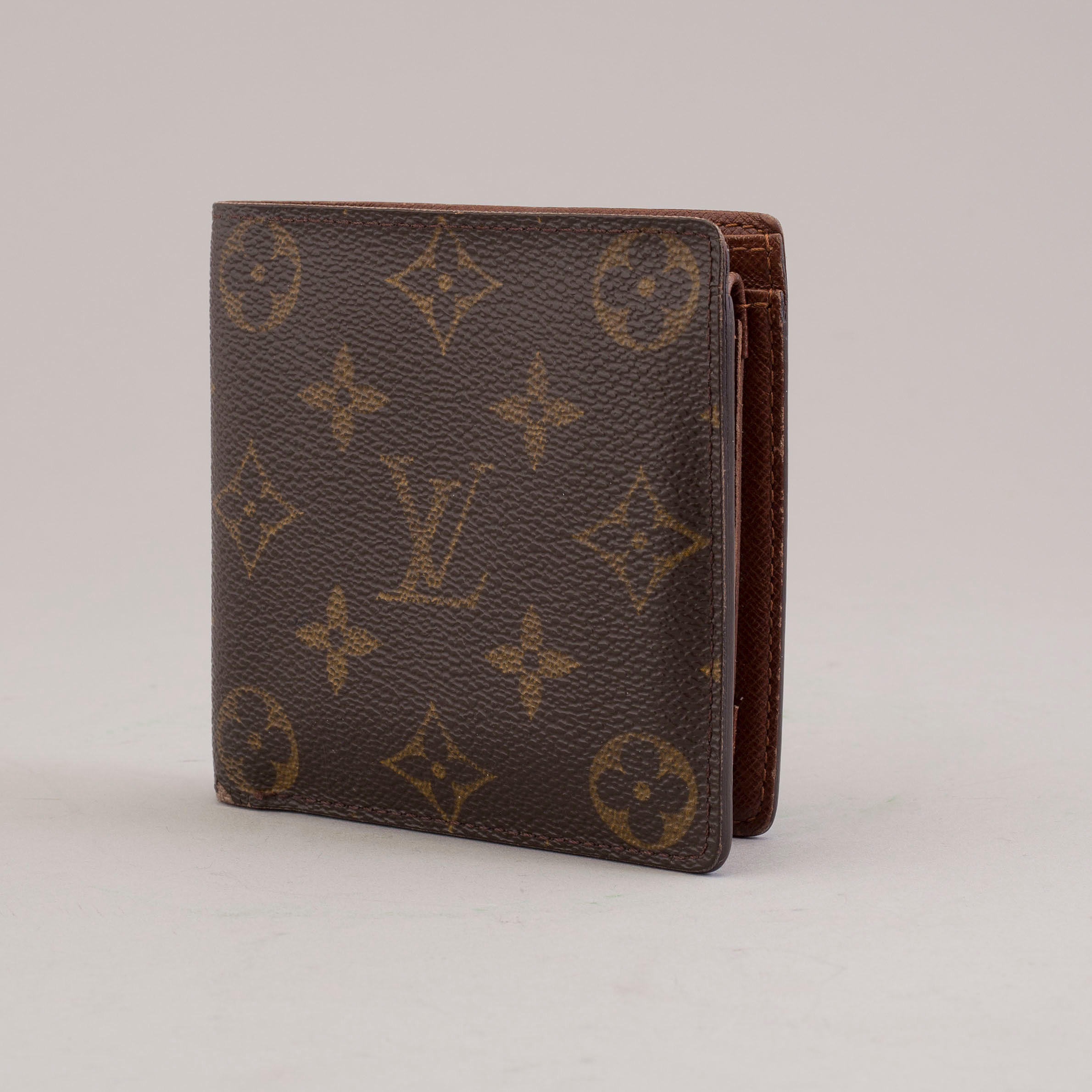 LOUIS VUITTON, a monogram canvas wallet. - Bukowskis