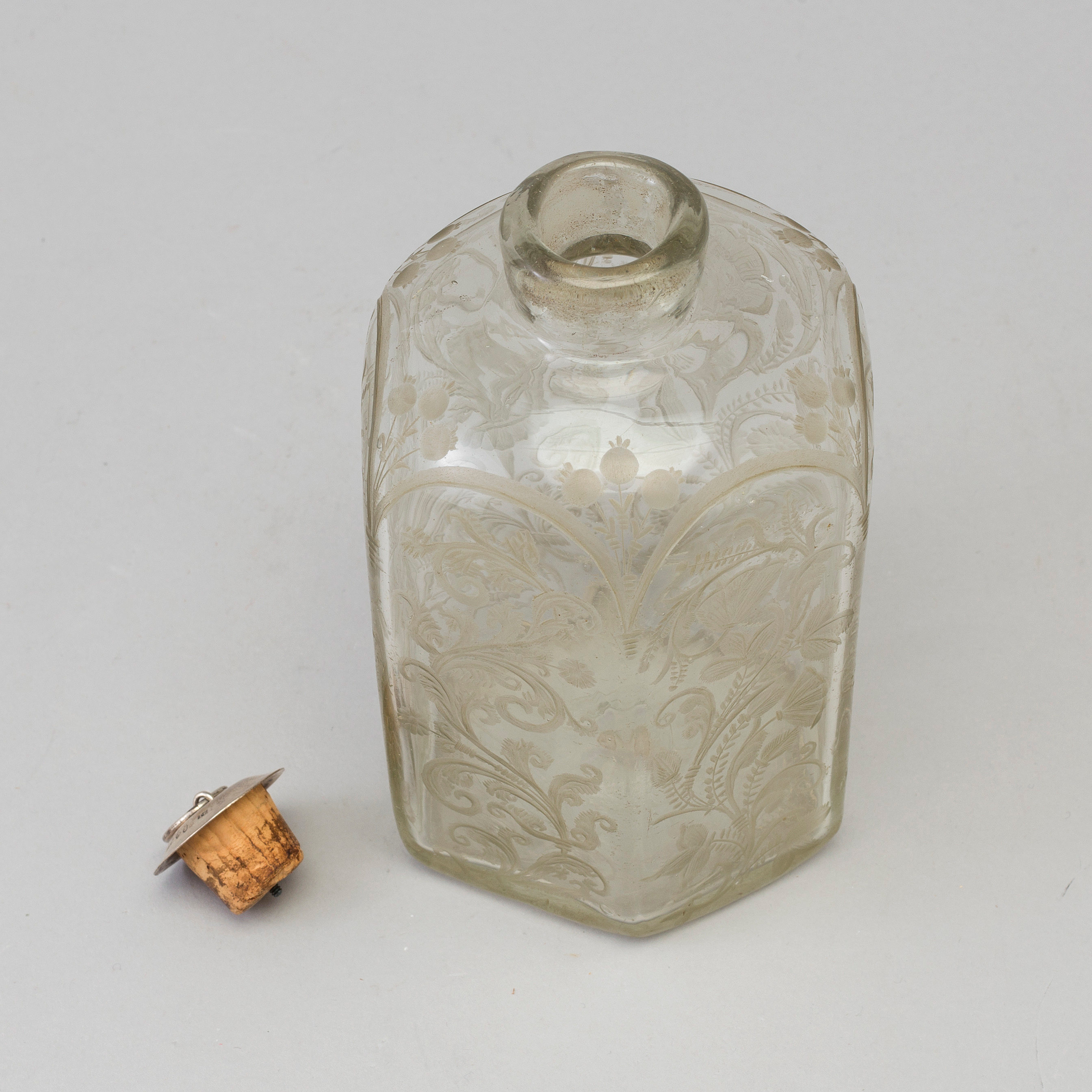A baroque glass bottle, first half of the 18th century. - Bukowskis