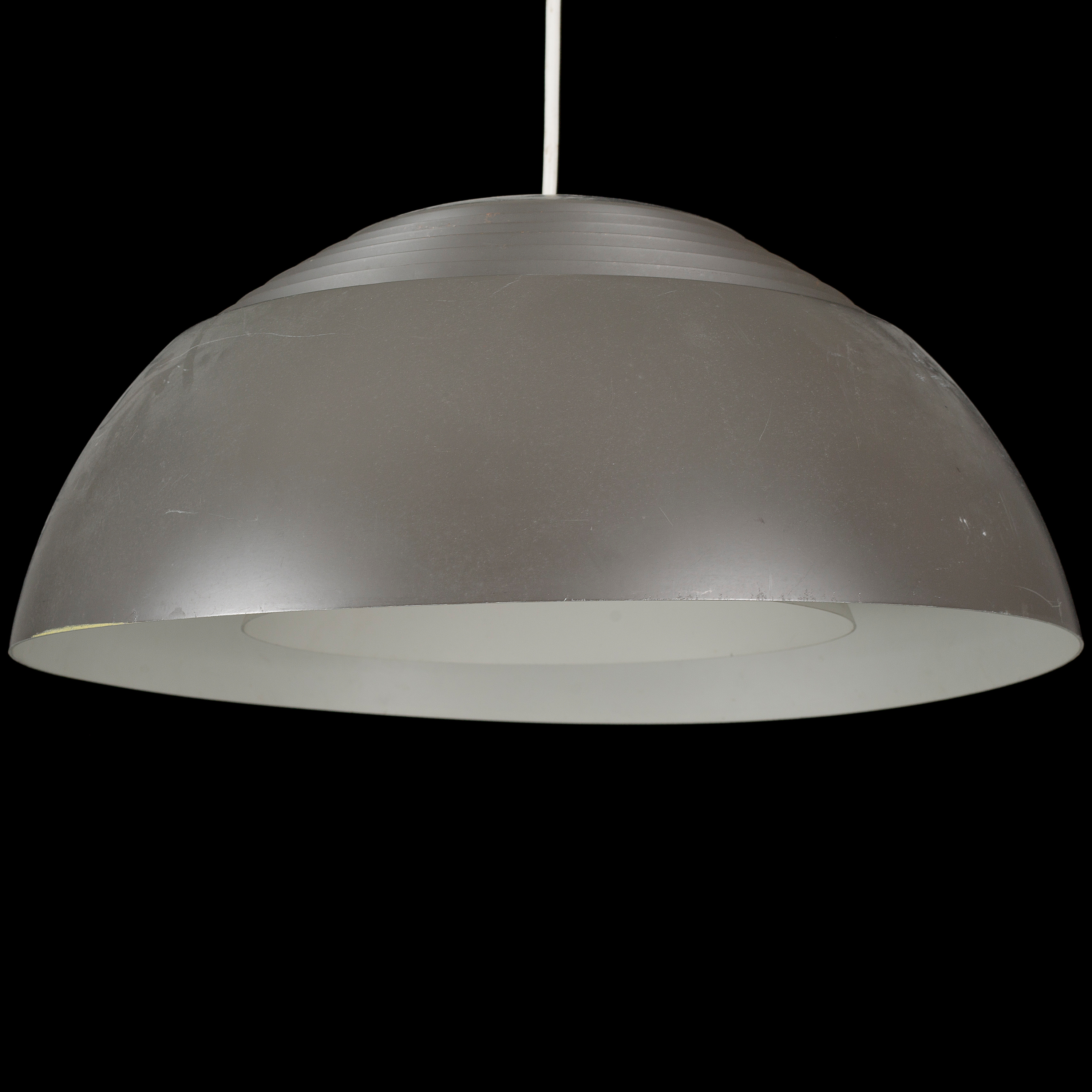 An "AJ Pendant" ceiling lamp, designed by Arne Jacobsen for Louis ...