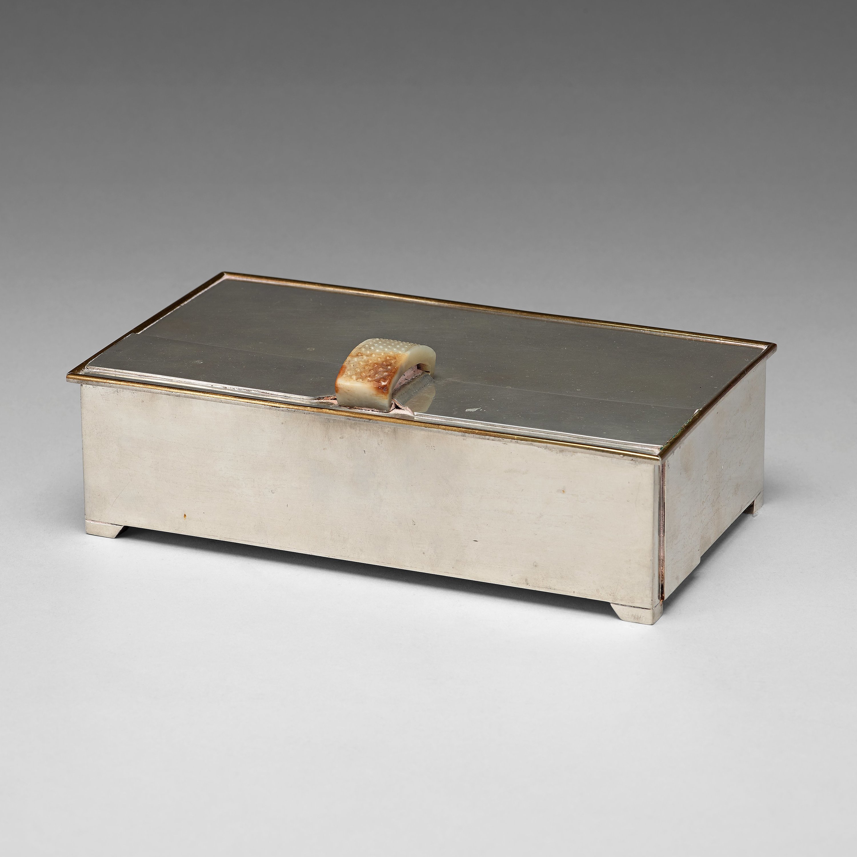 Nils Fougstedt, a pewter, brass and nephrite box, Svenskt Tenn ...