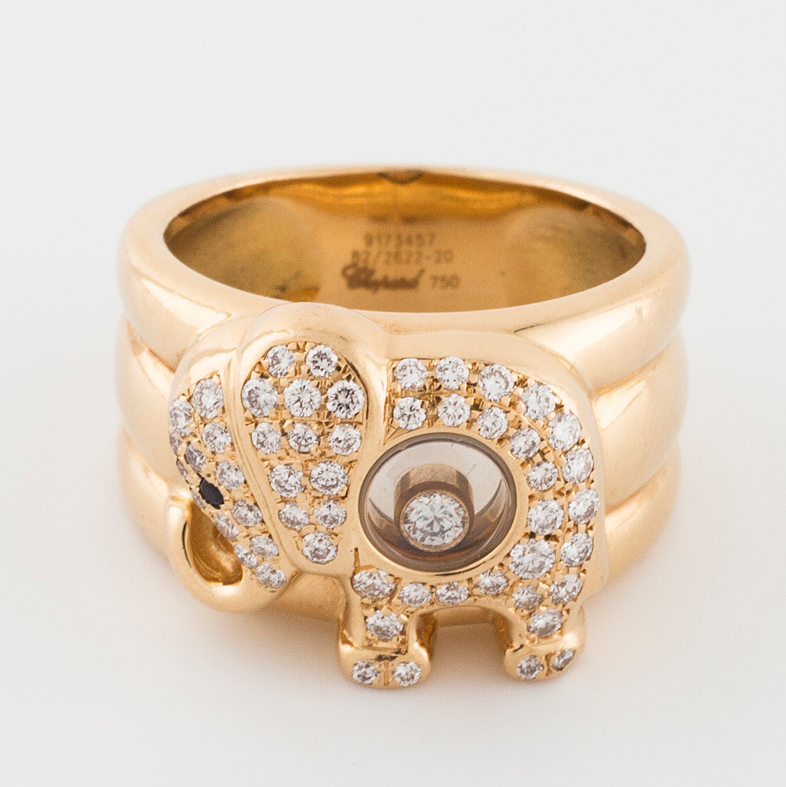 CHOPARD, a "Happy Diamonds" brilliant cut diamond and sapphire ring ...