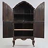 Tor Hörlin, a Swedish Grace decorated oak cabinet, dated 1920. - Bukowskis