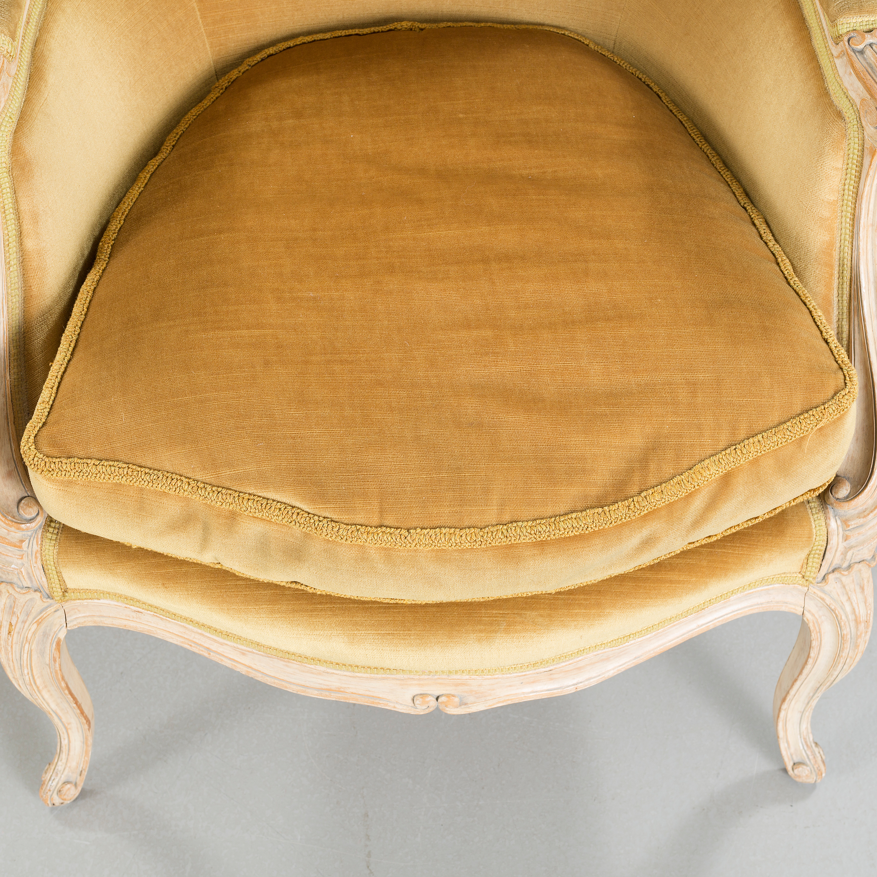 A pair of rococo style lounge chairs, first half of the 20th century ...