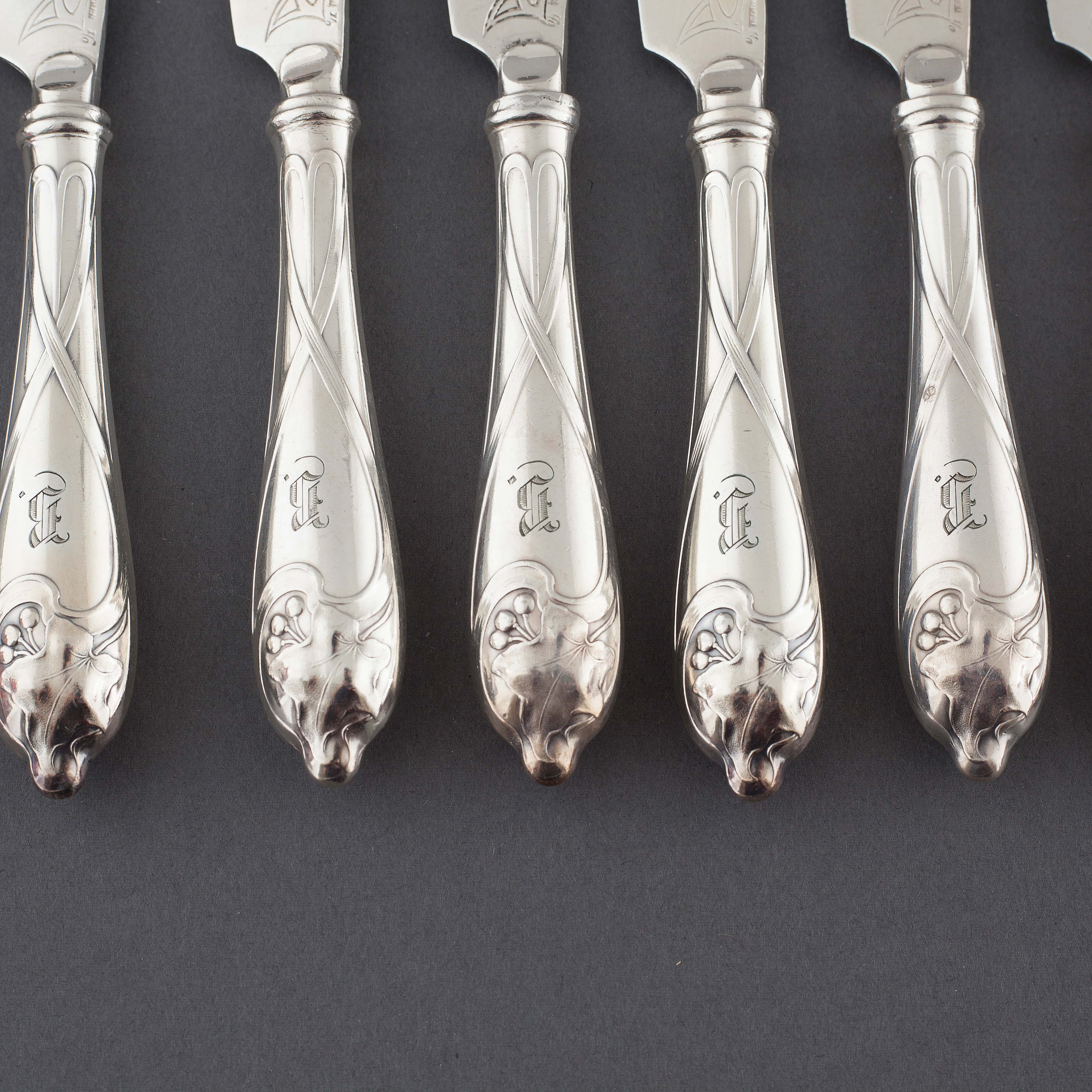 An early 20th century set of 26 pcs of silver plated fish flatware by ...