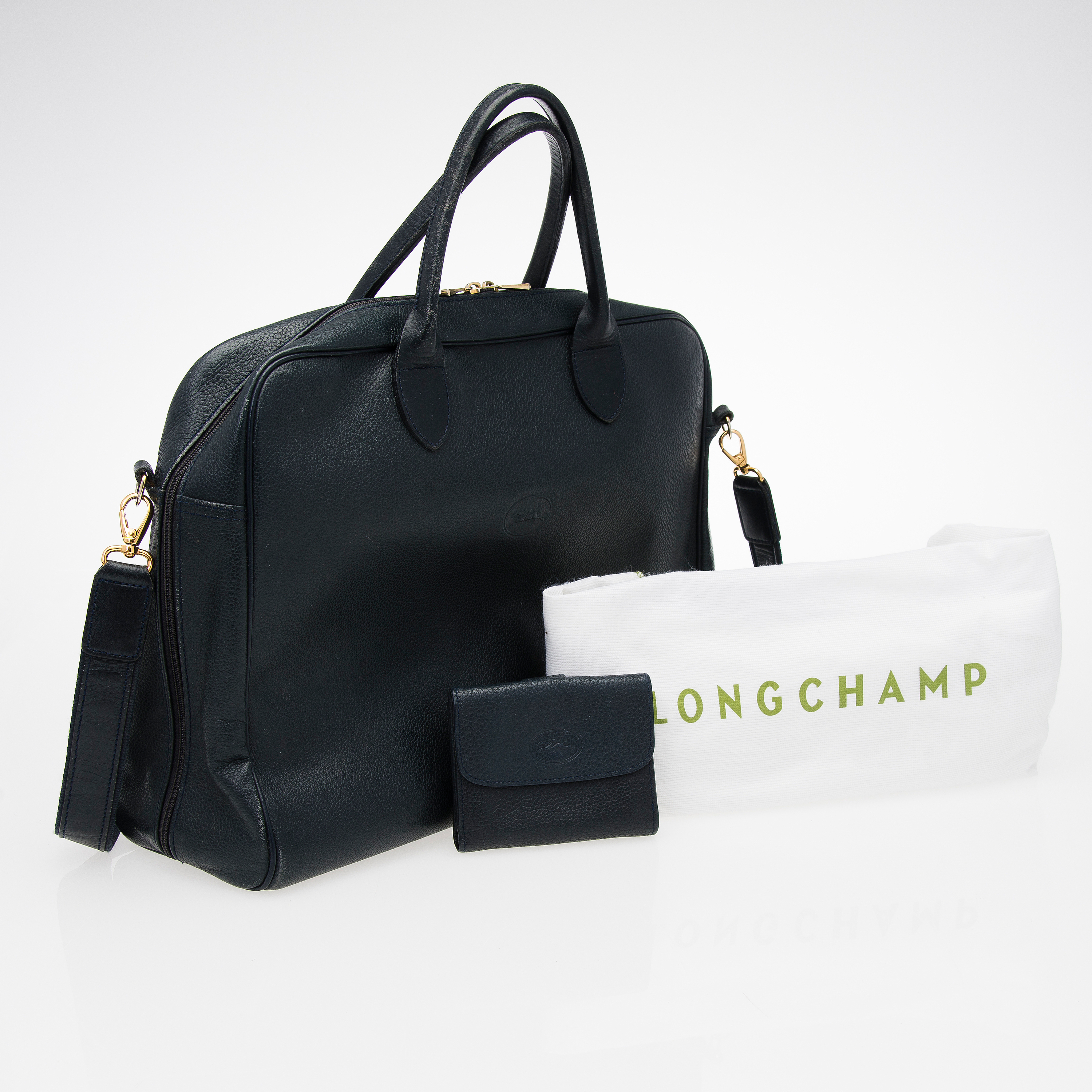 A Longchamp Briefcase and a Wallet. - Bukowskis