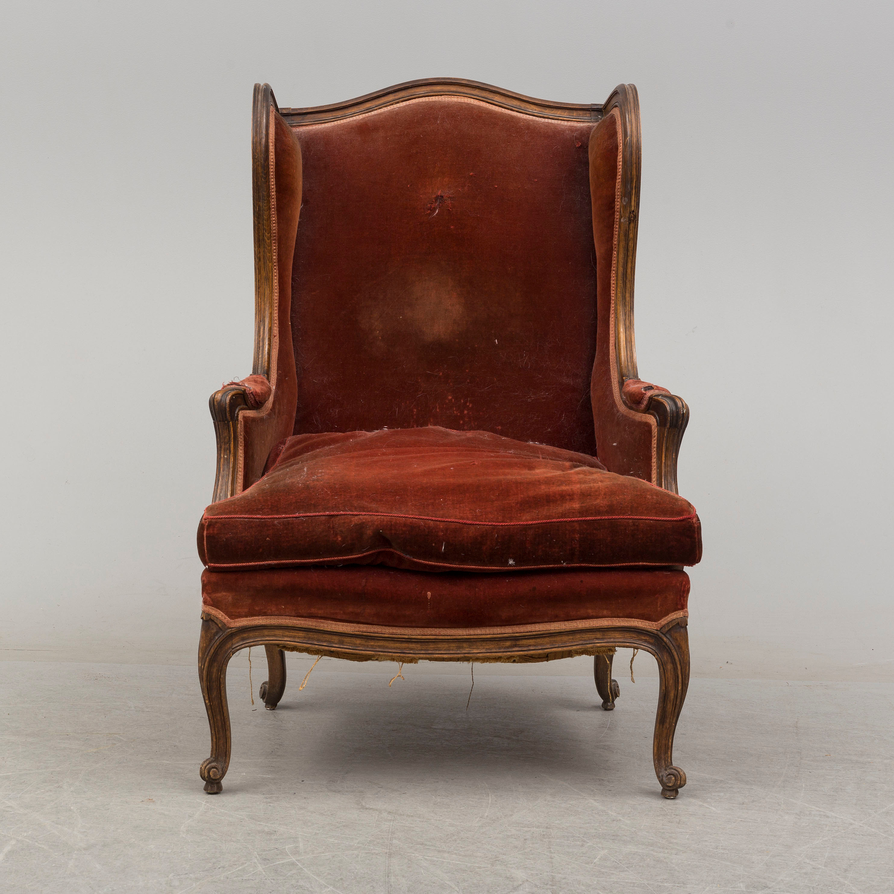 A 19th century rococo style easy chair. - Bukowskis