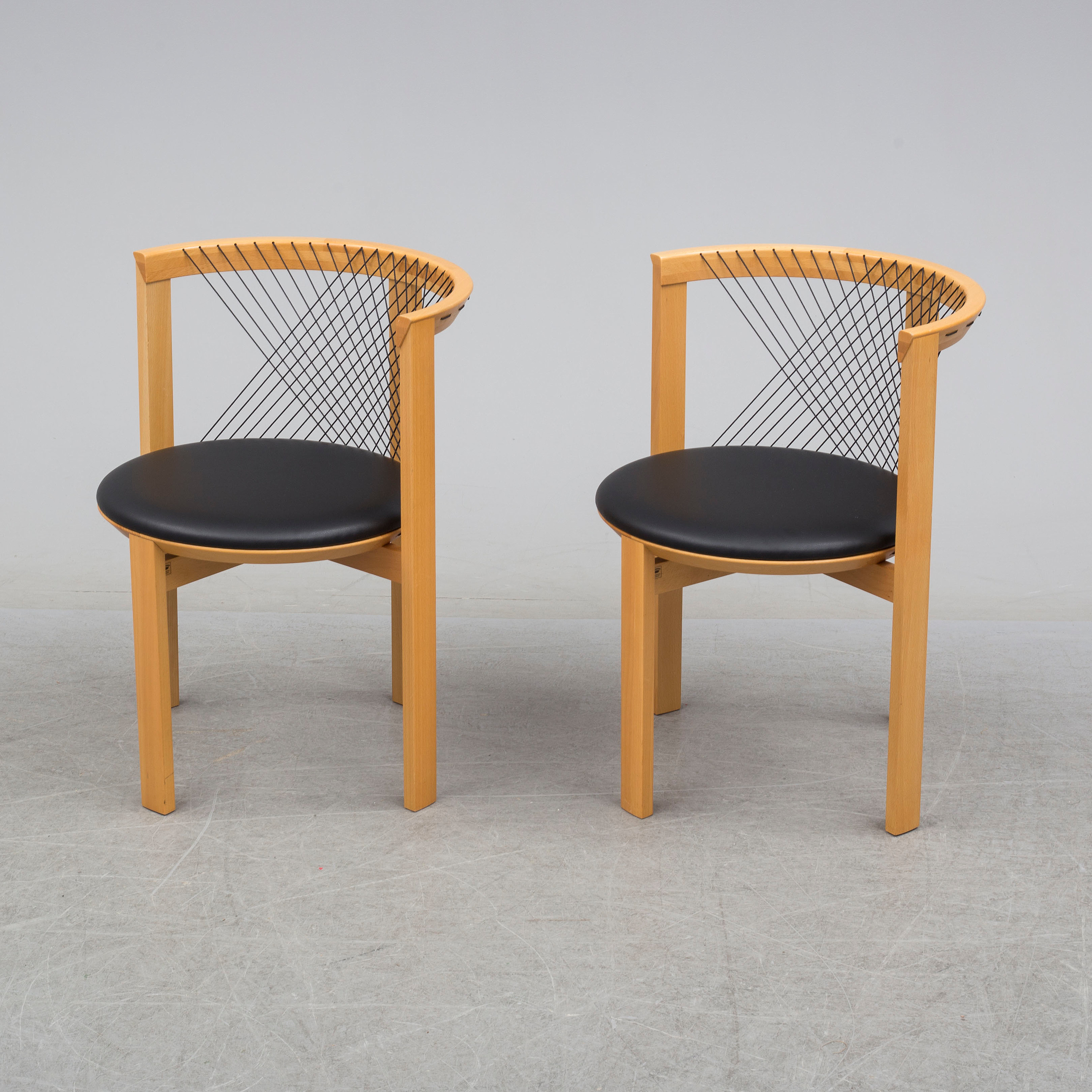 a pair of 'String Chairs' by Niels Jörgen Haugensen, Tranekaer ...
