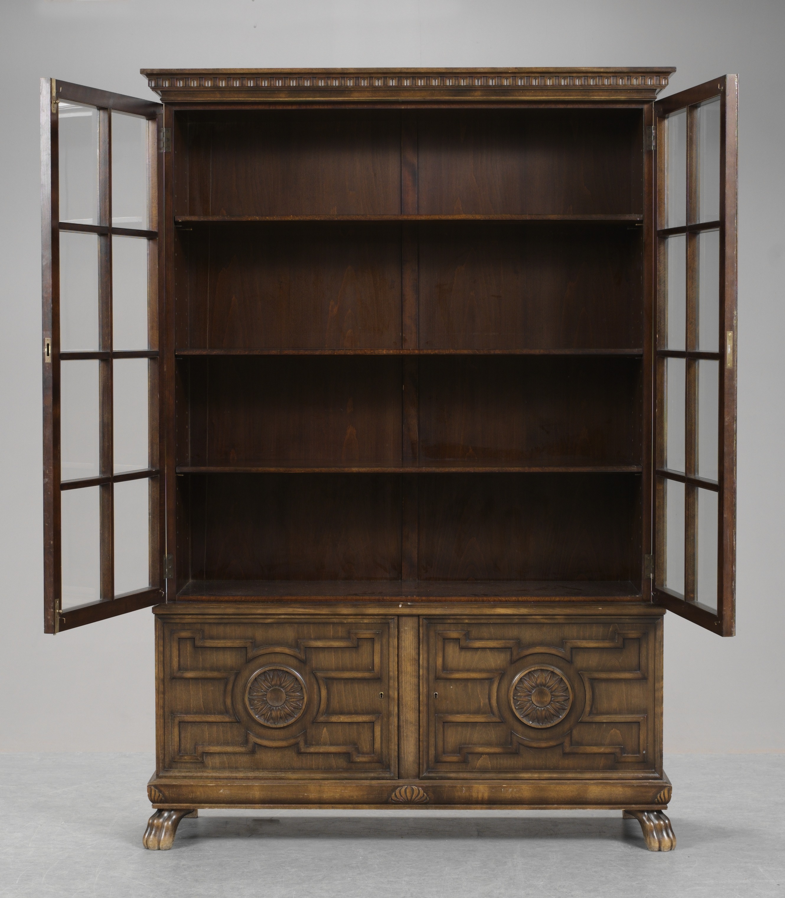 An Axel-Einar Hjorth stained birch glass cabinet, Nordiska Kompaniet ...