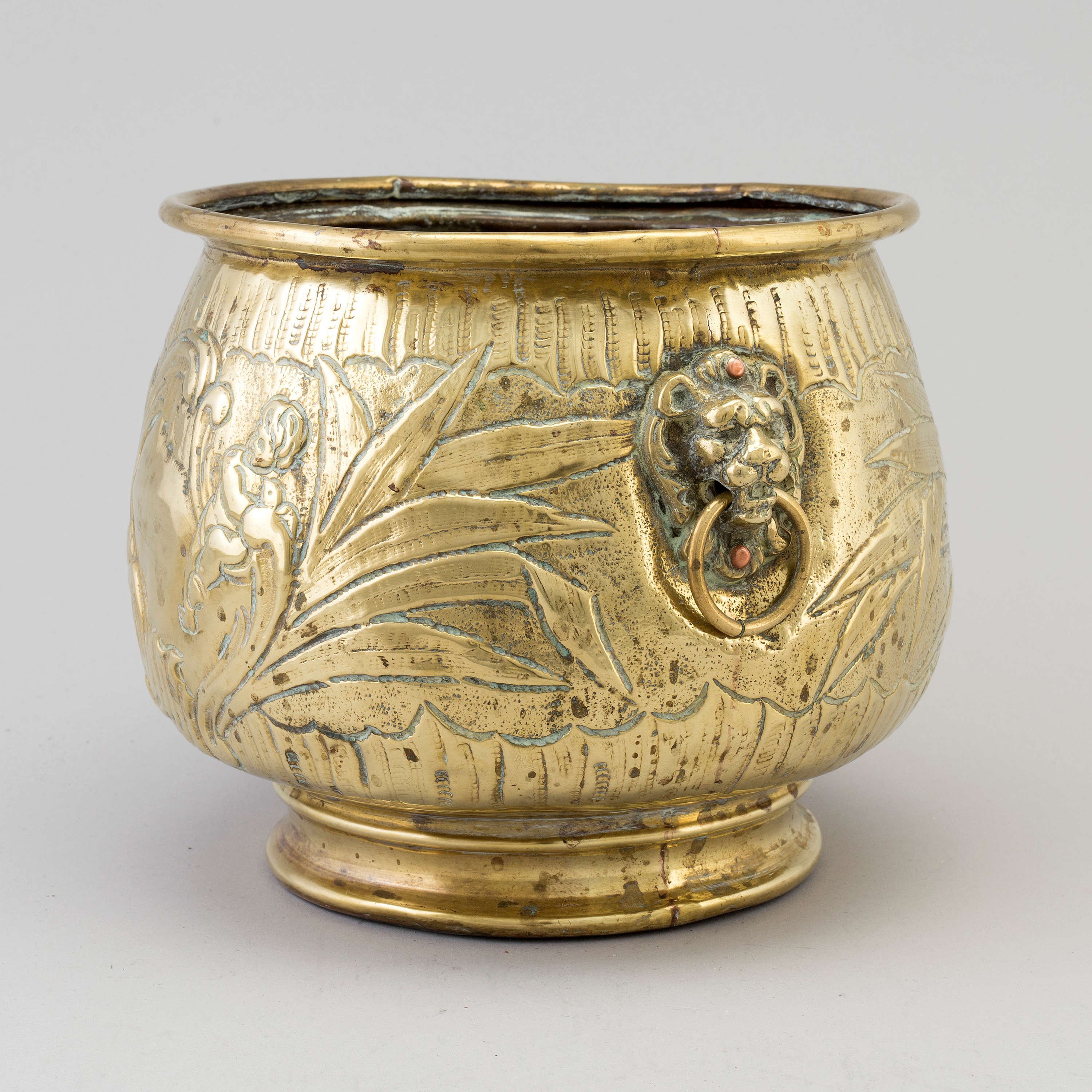 A 19th century brass flower pot. - Bukowskis