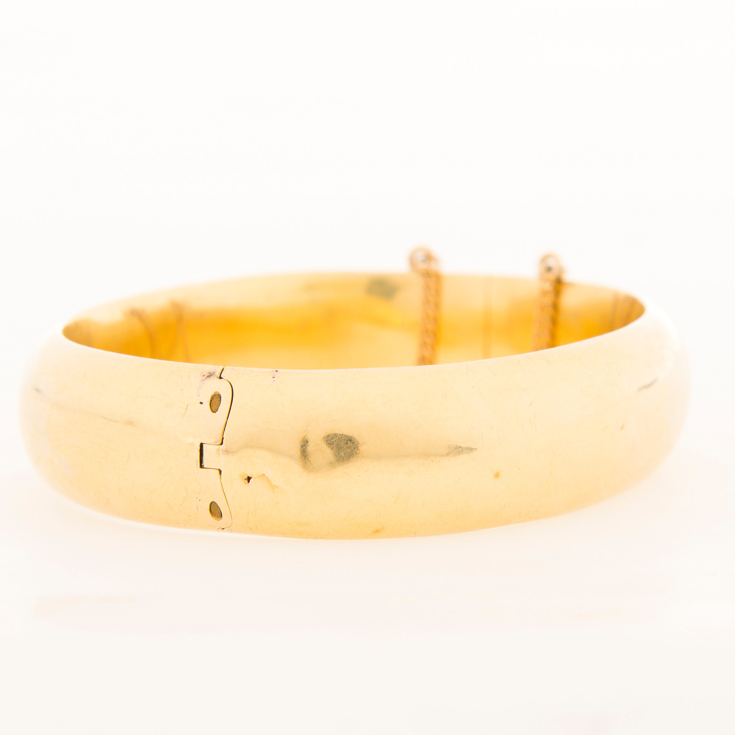A 19th Century Russian 14K gold (56) bangle, maker's mark GS, Saint ...