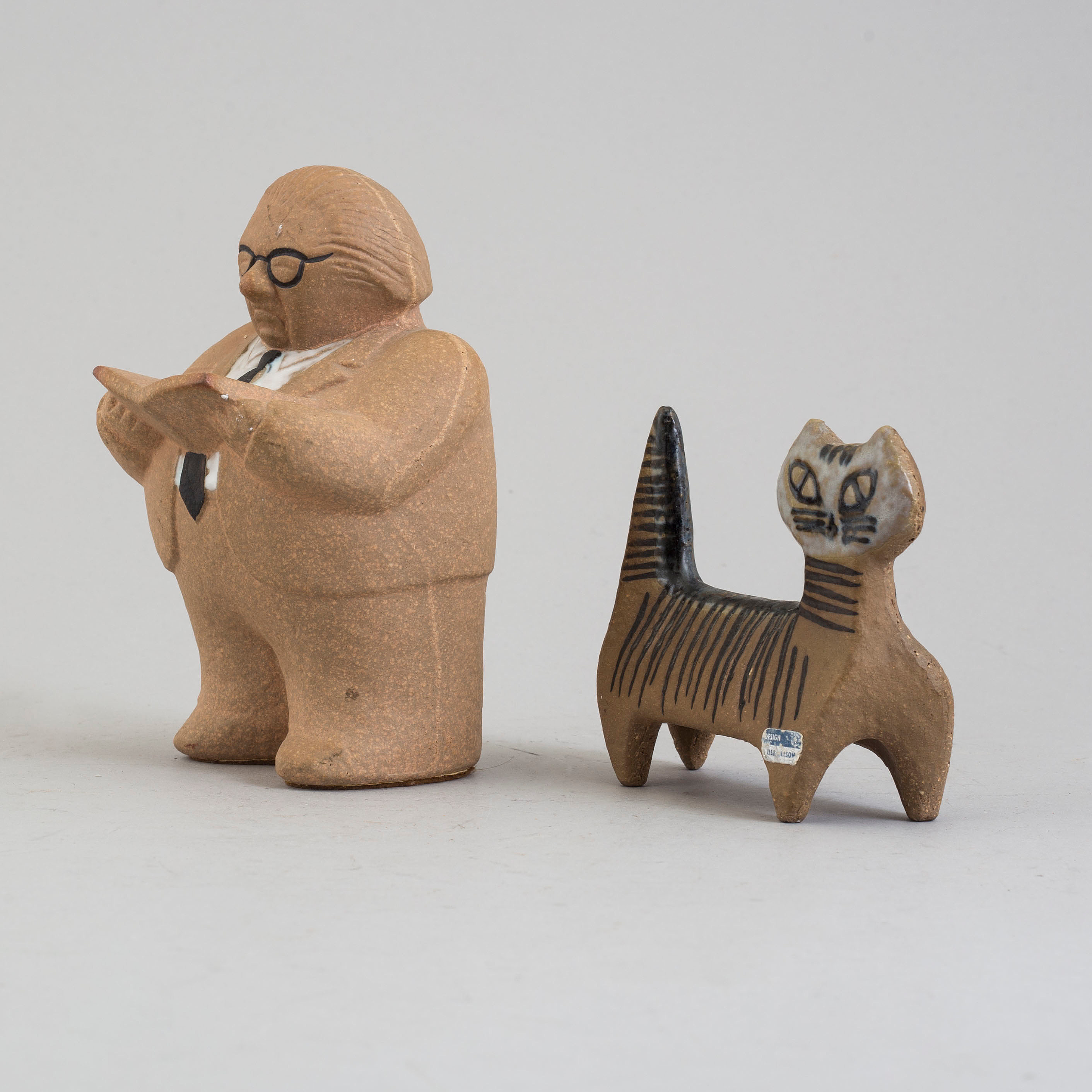 LISA LARSON, two stoneware figurines from Gustavsberg. - Bukowskis