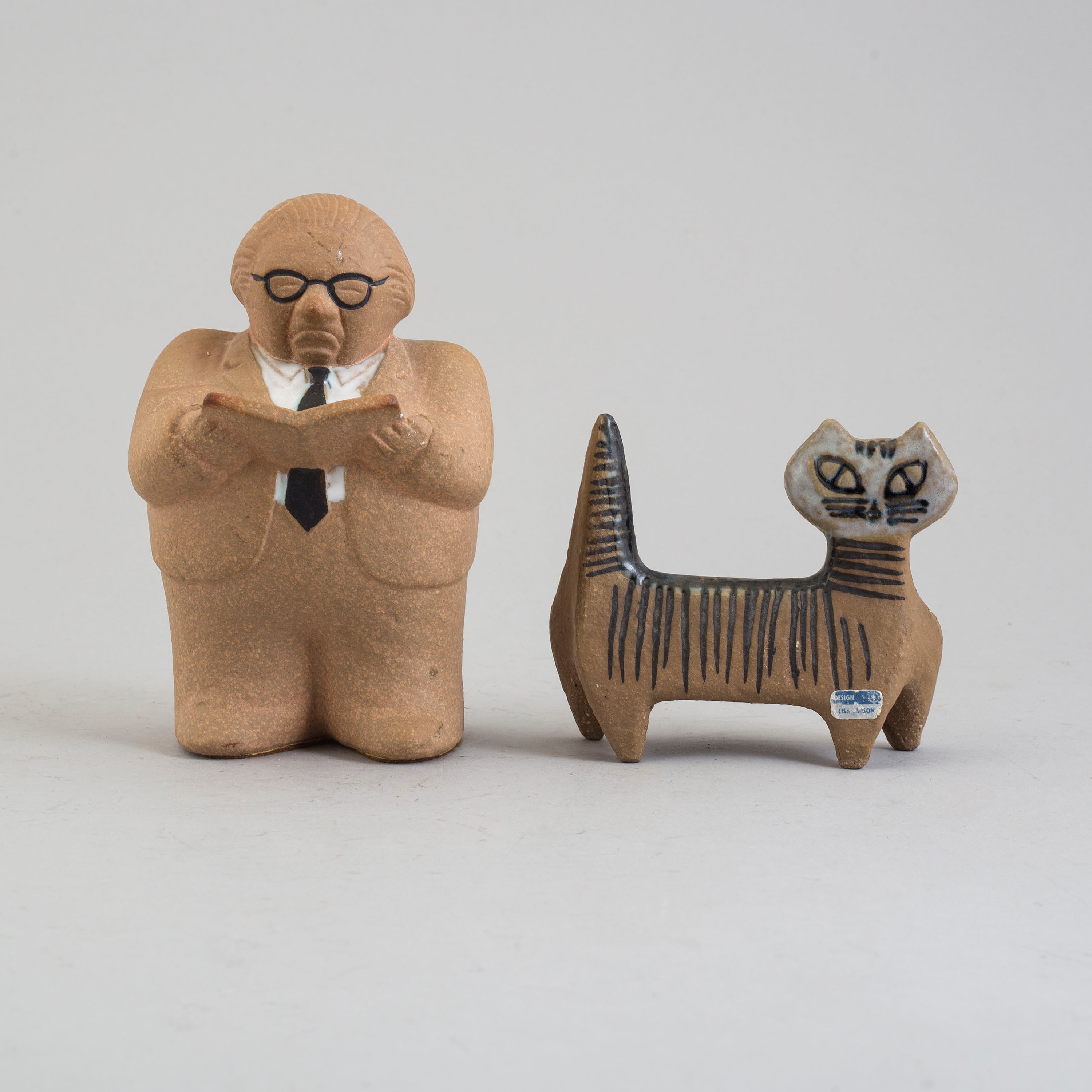 LISA LARSON, two stoneware figurines from Gustavsberg. - Bukowskis