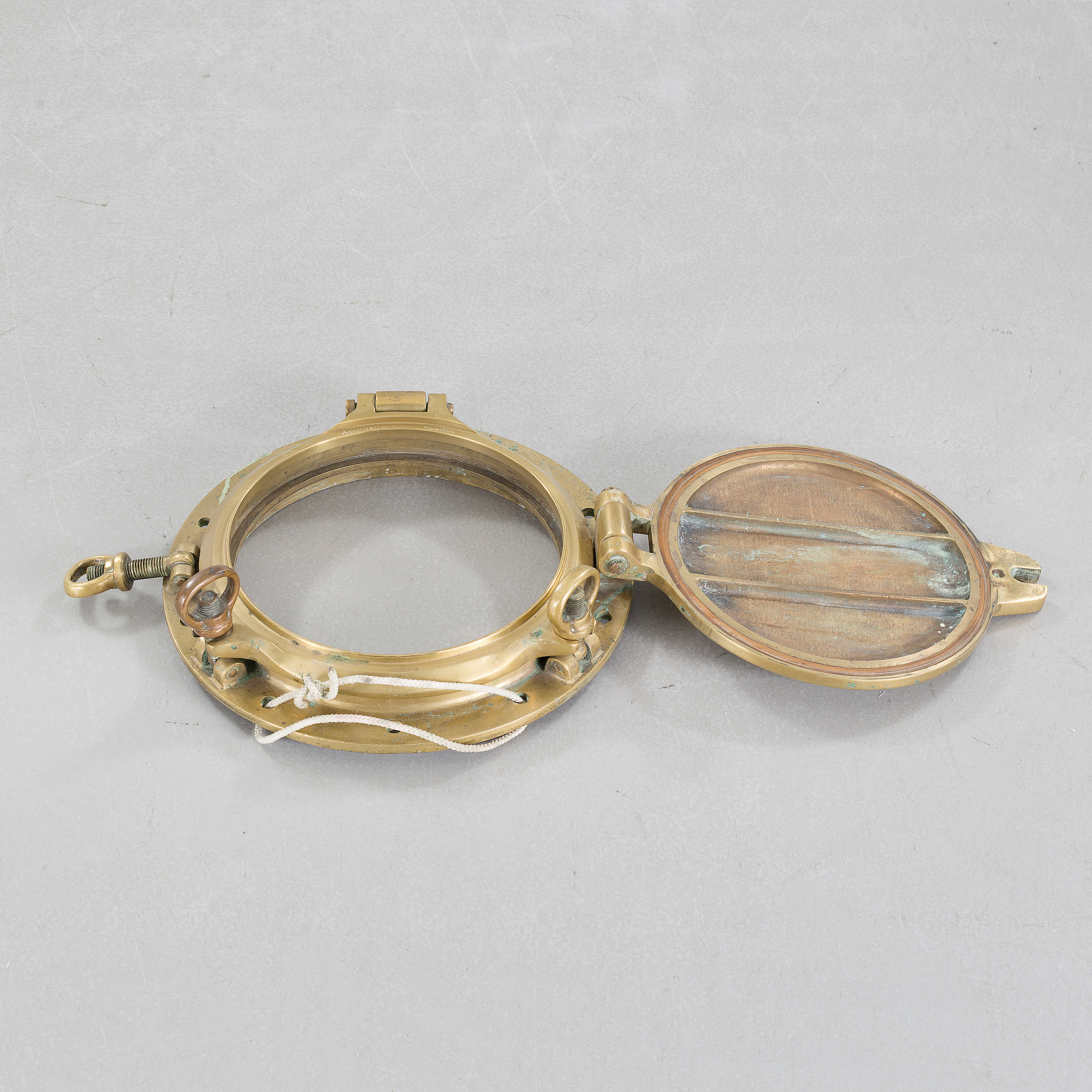 A brass ship hatch, 20th century. - Bukowskis