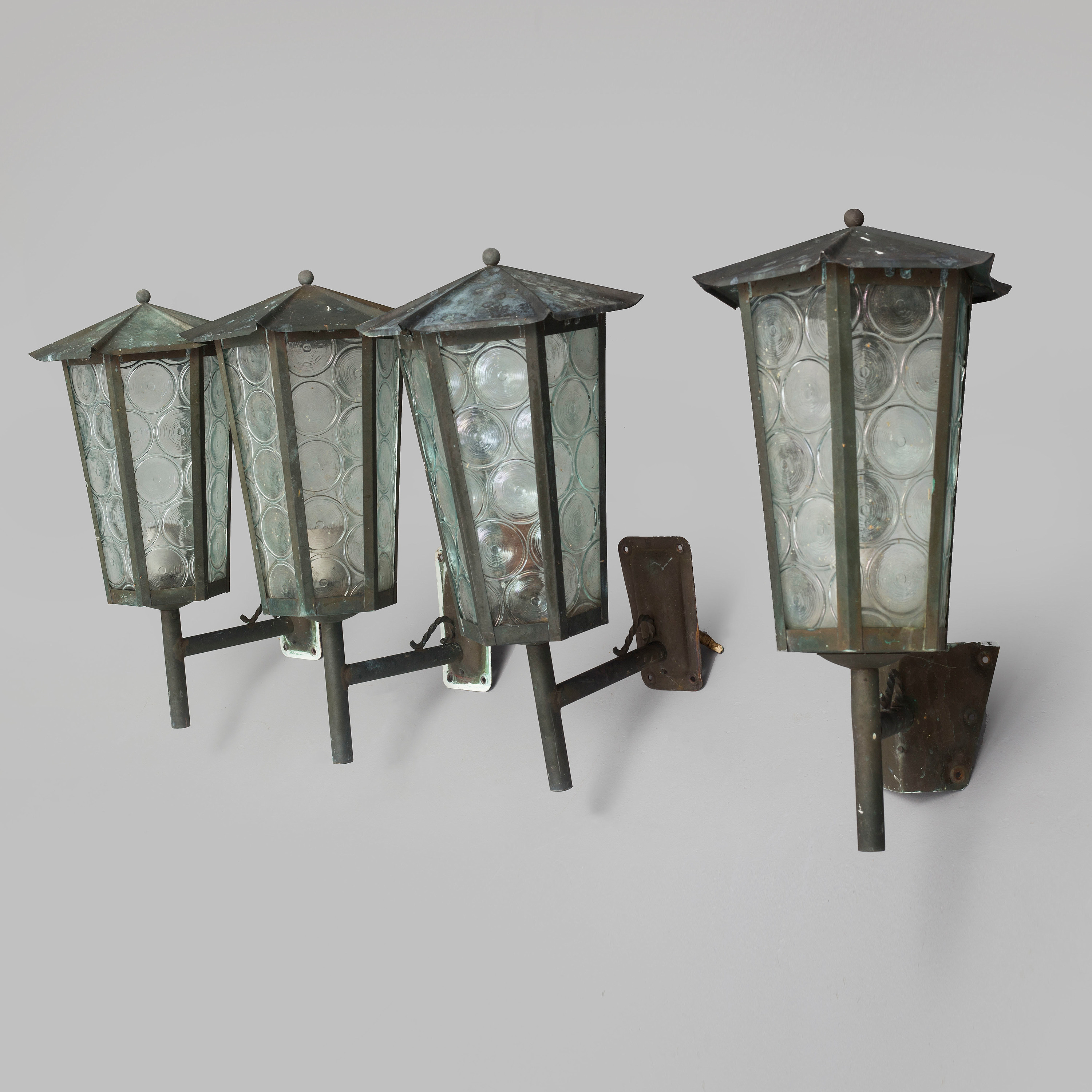 Four first half of the 20th century outer wall lamps. - Bukowskis