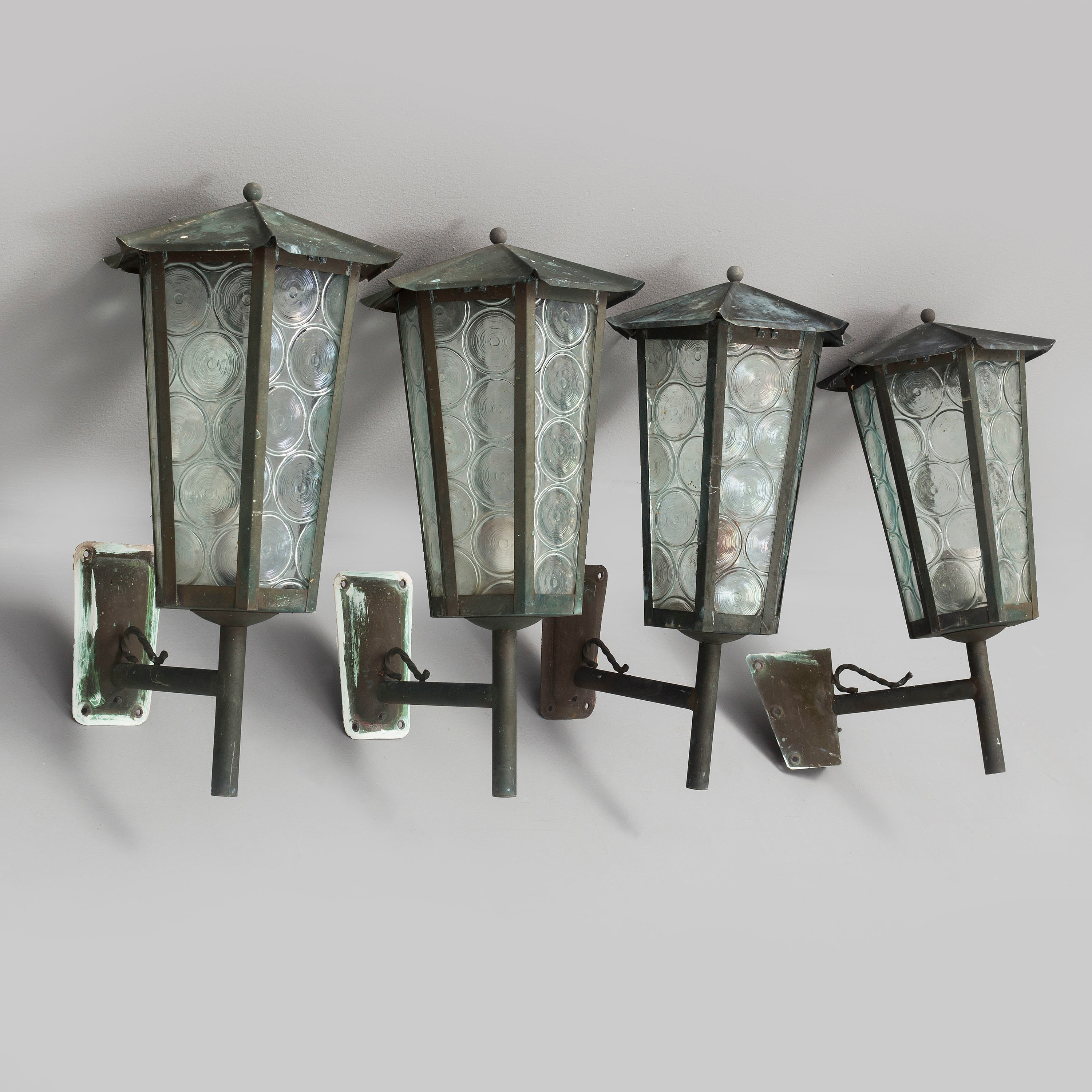 Four first half of the 20th century outer wall lamps. - Bukowskis