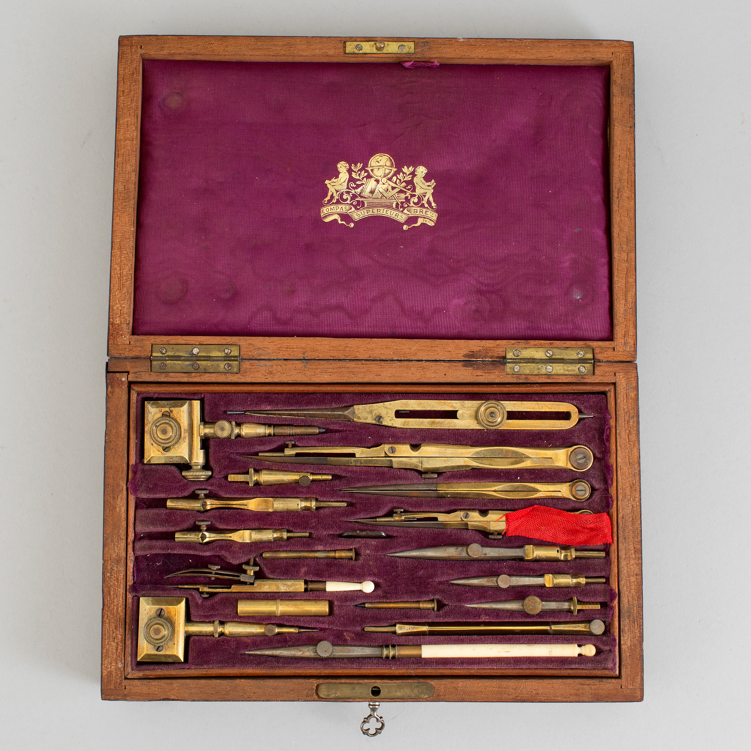 An early 20th century case with enginer drafting tools by Compas ...