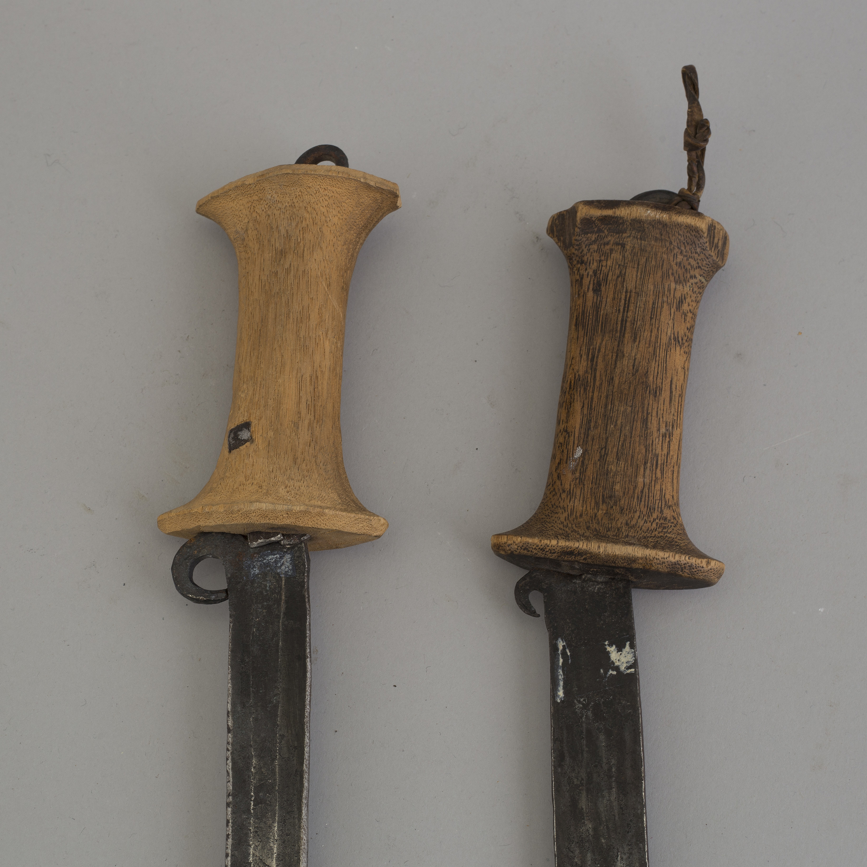 Two 20th century sickle swords. - Bukowskis