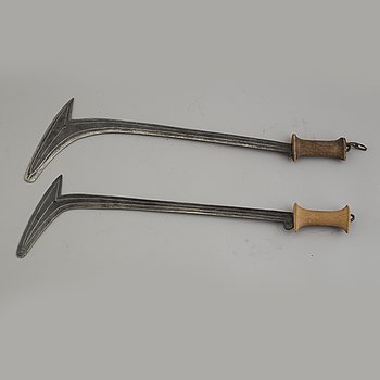 Two 20th century sickle swords. - Bukowskis