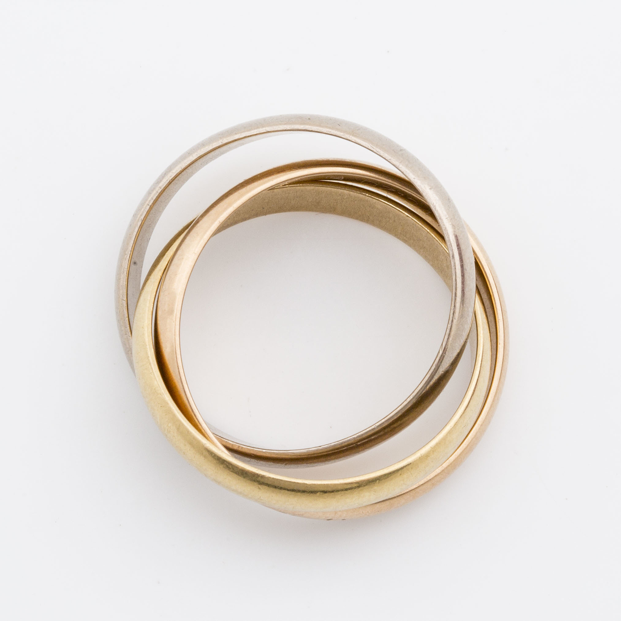CARTIER, RING "Trinity", 18K guld. - Bukowskis