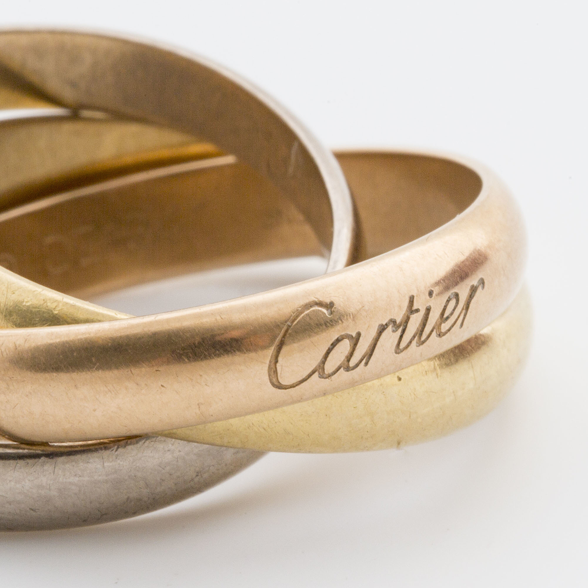 CARTIER, RING "Trinity", 18K guld. - Bukowskis