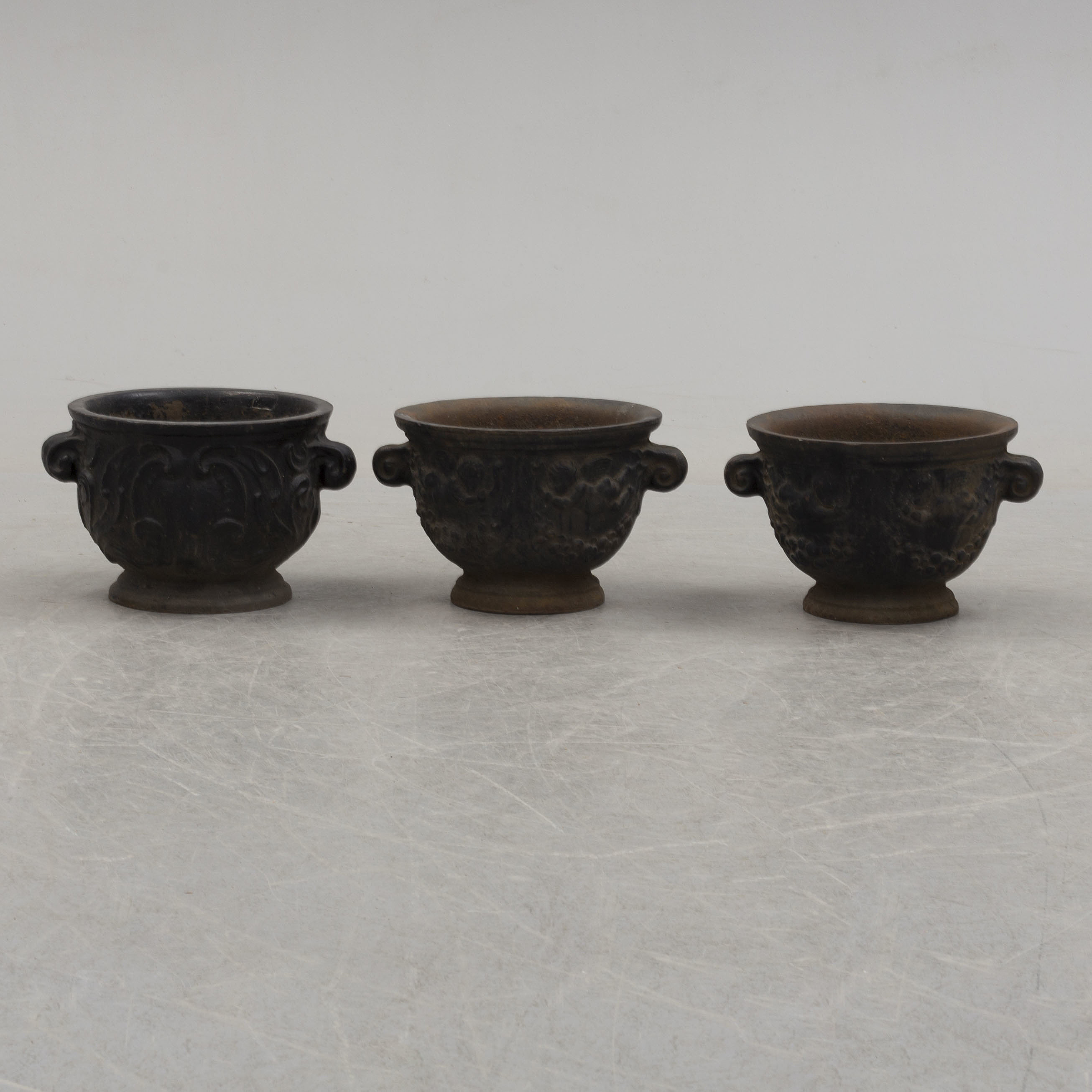Three mid 20th century cast iron flower potts by Nävekvarns Bruk ...