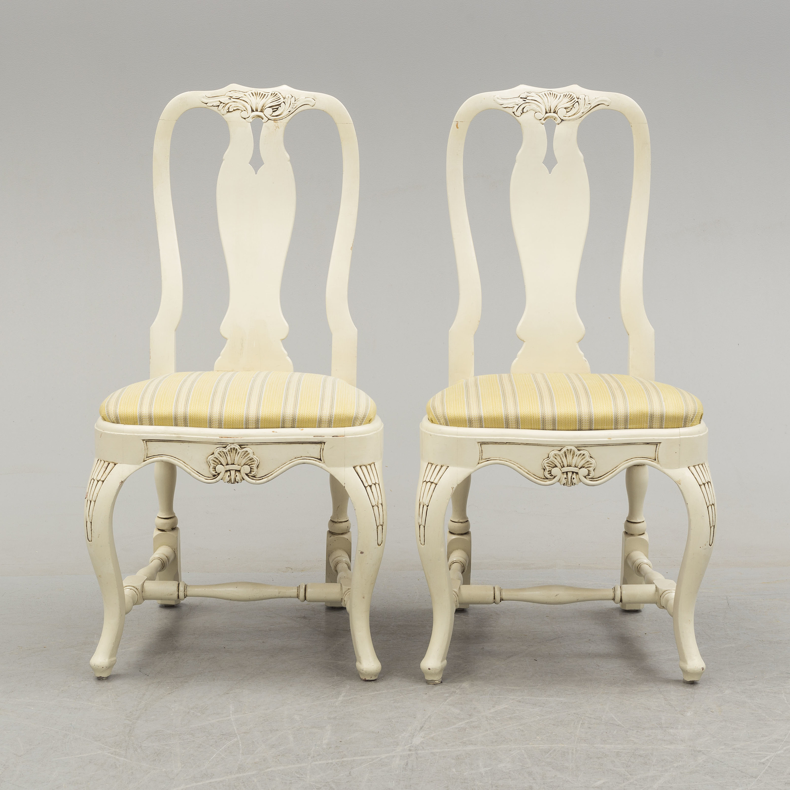A set of four mid 20th century rococo style chairs. - Bukowskis
