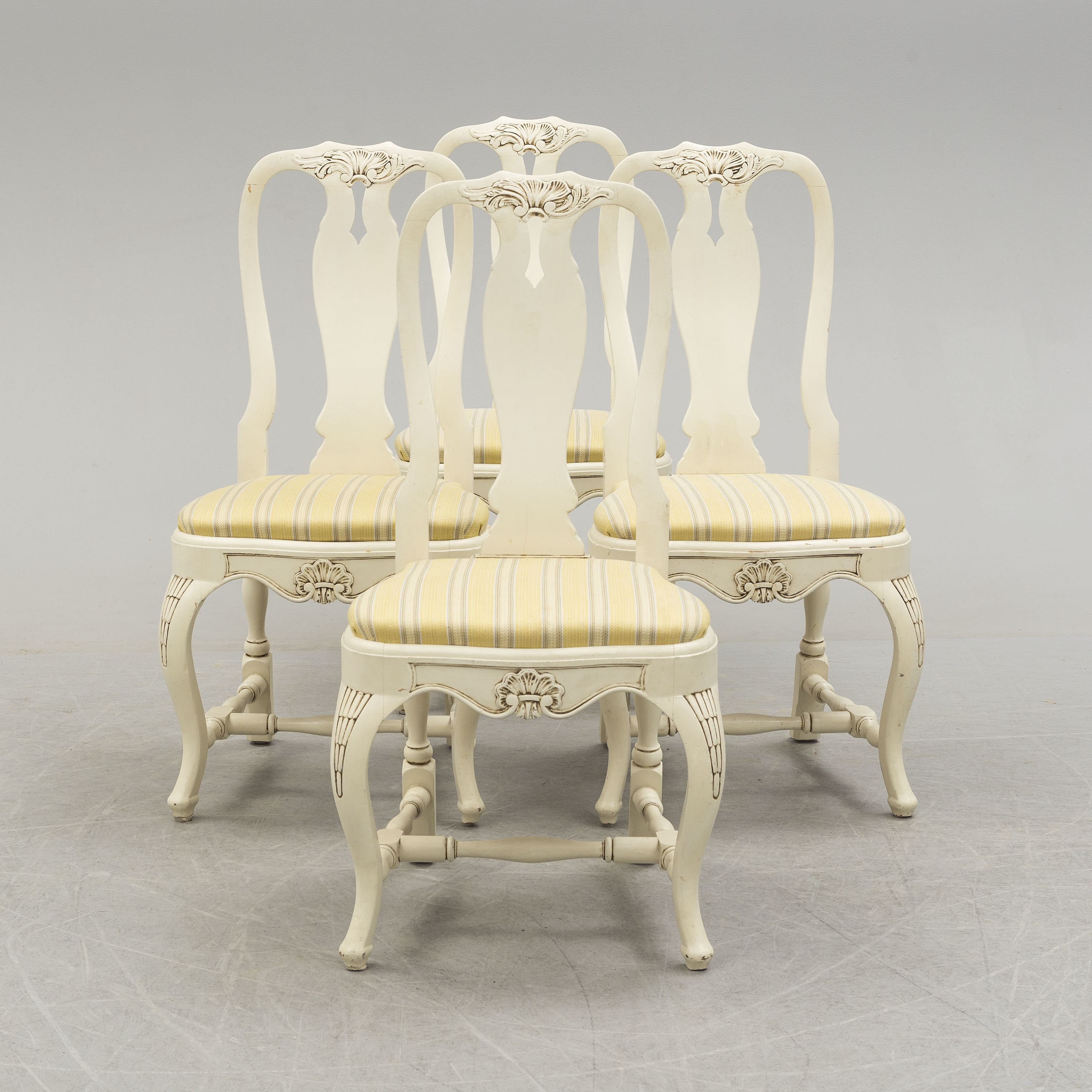 A set of four mid 20th century rococo style chairs. - Bukowskis