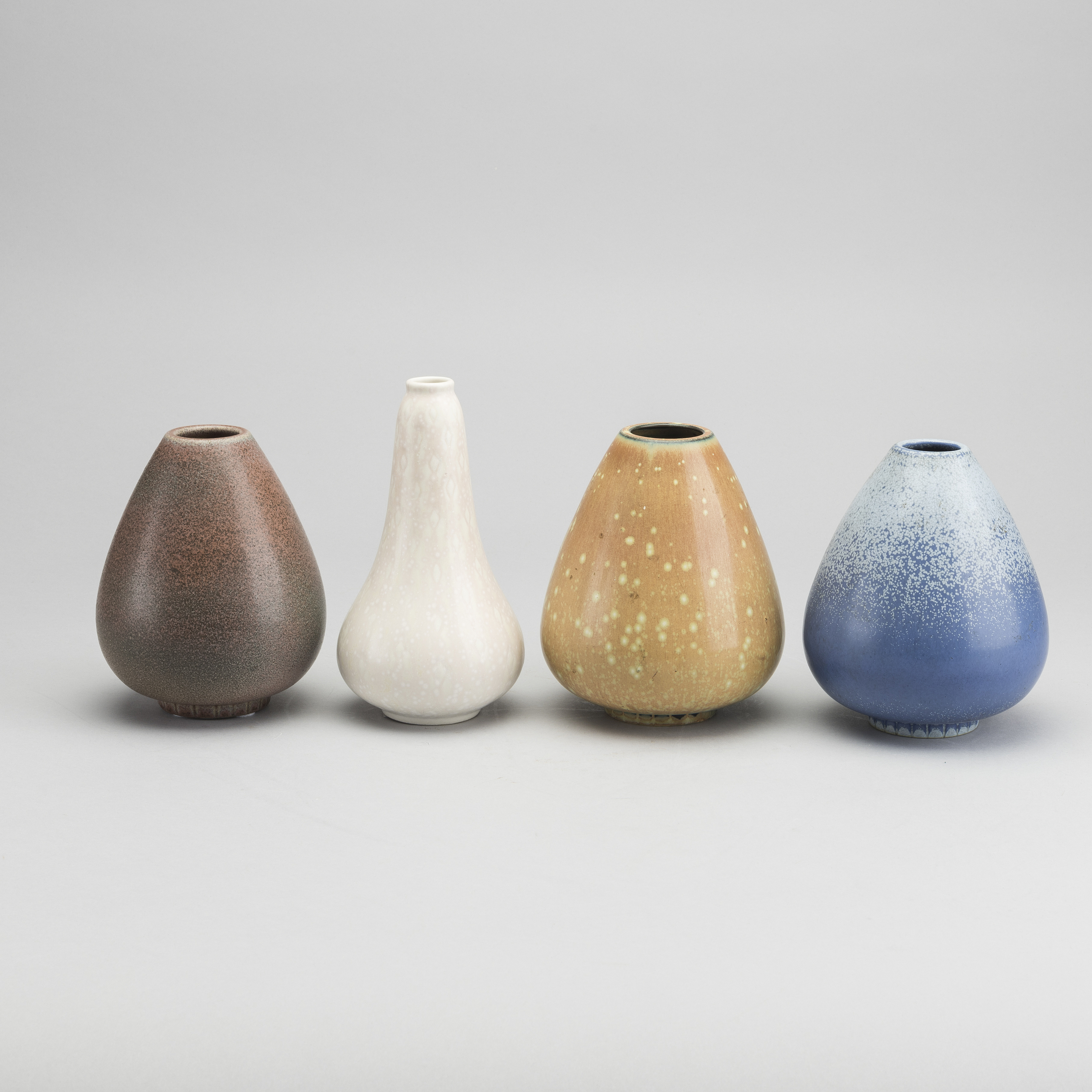 GUNNAR NYLUND, 4 stoneware vases, Rörstrand. - Bukowskis