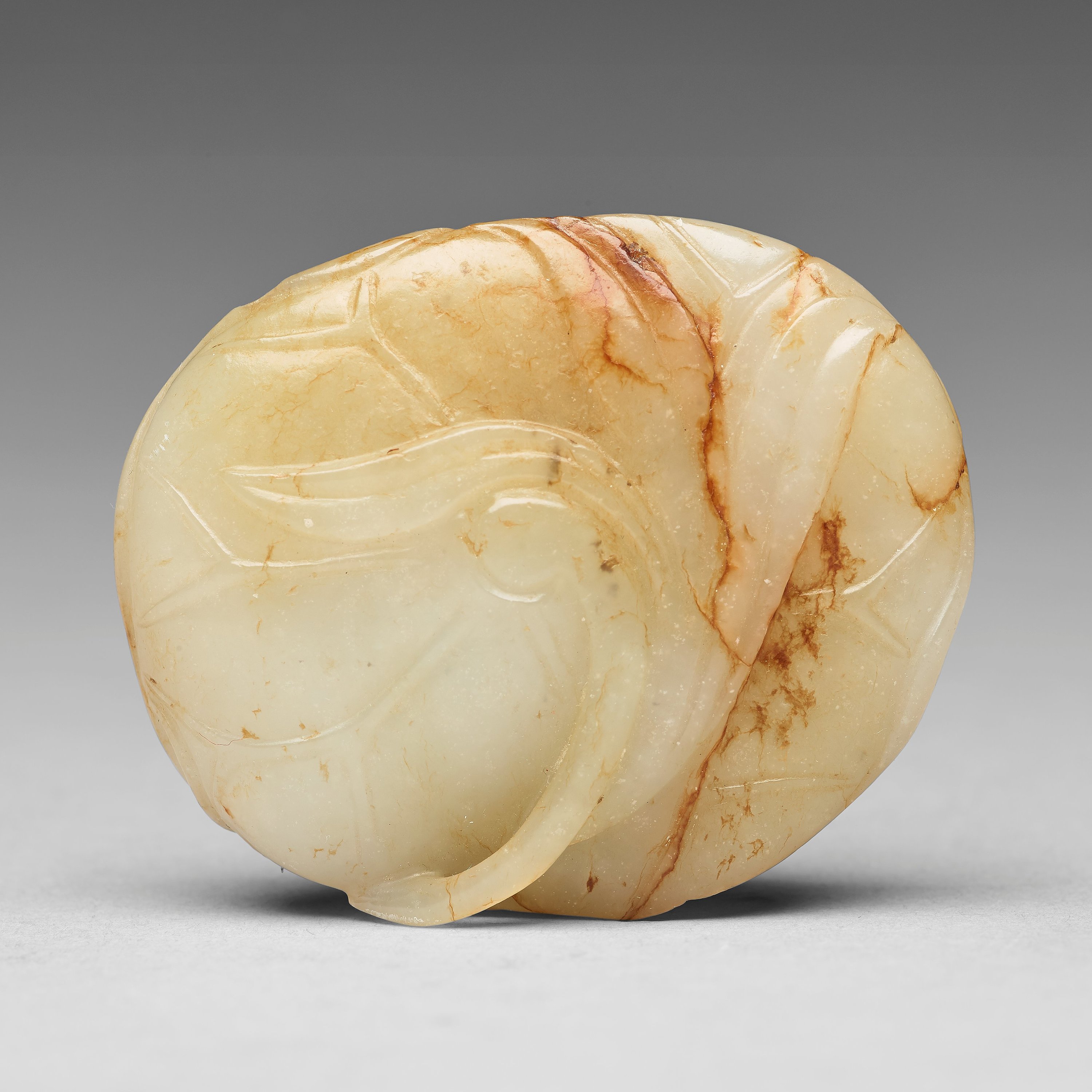 A nephrite carving of two fishes, Qing dynasty (1644-1912). - Bukowskis
