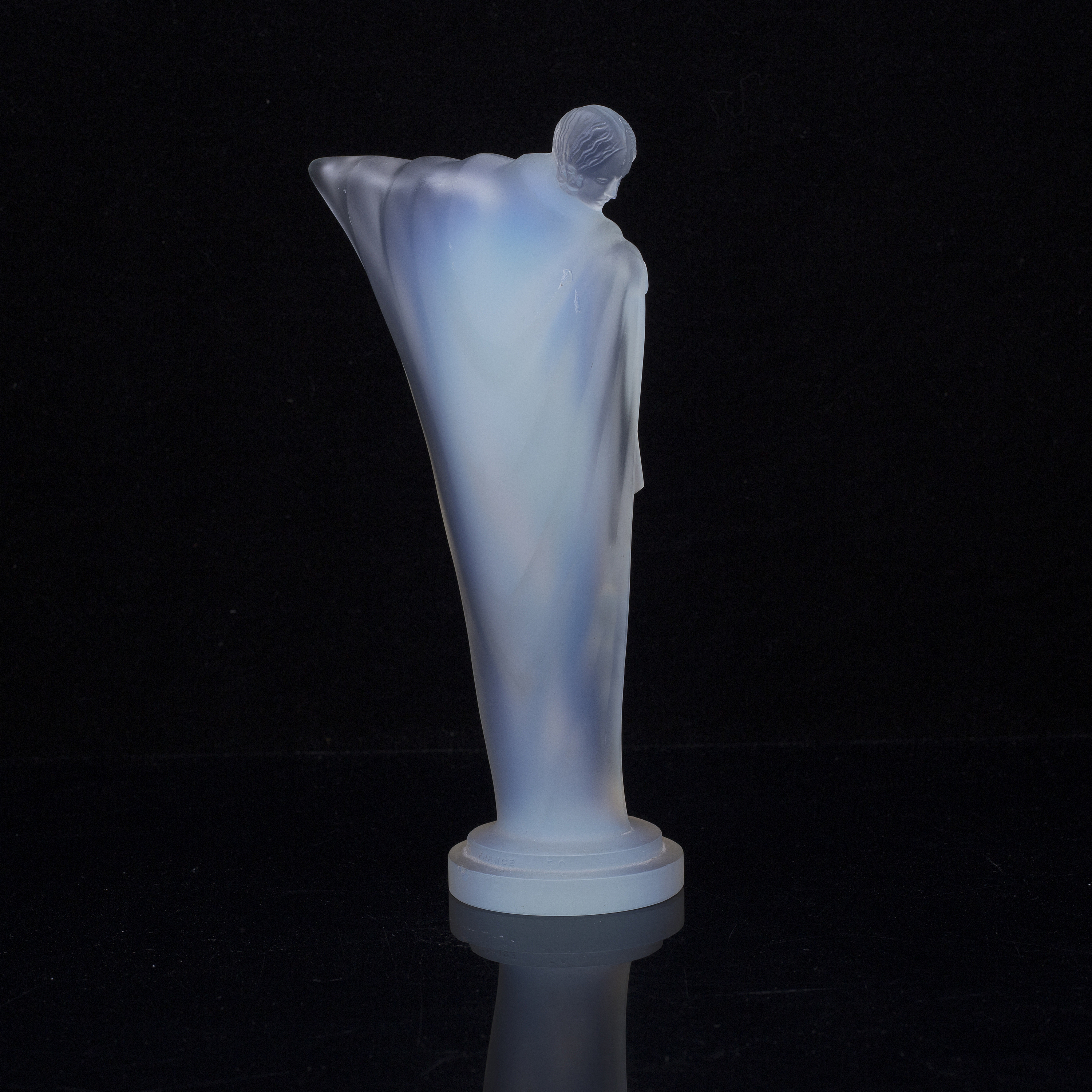 An Edmond Etling opalescent 'Isadora Duncan' moulded glass figure ...