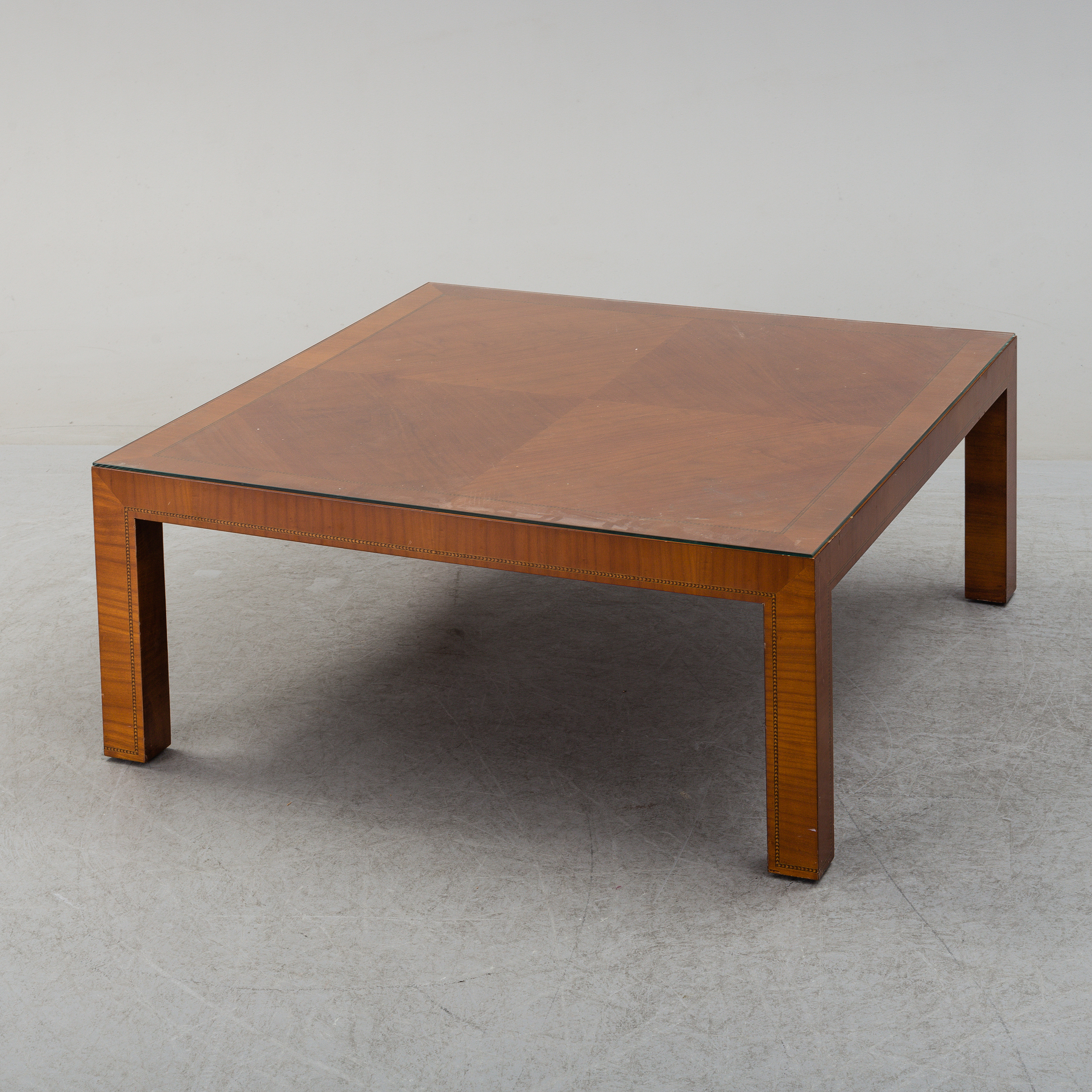 A second half of the 20th century walnut veneered coffee table. - Bukowskis
