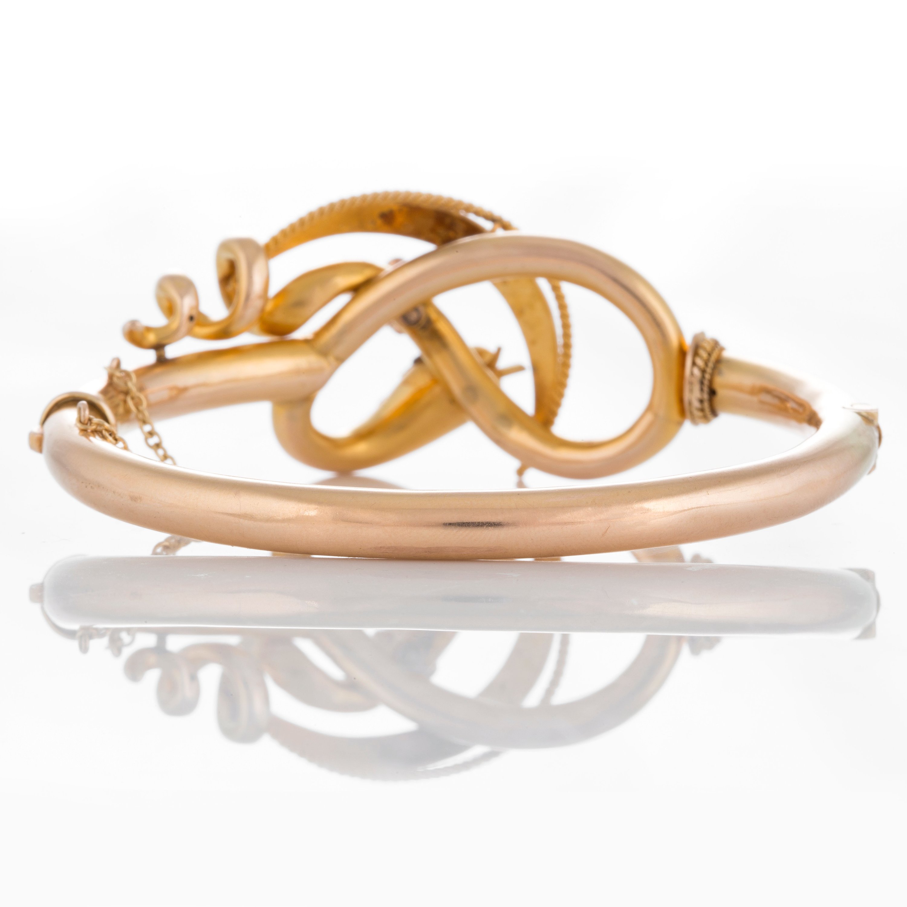 Armring i form av en orm 14K guld med en rosenslipad diamant, pärlor, cabochonslipad rubin och ...