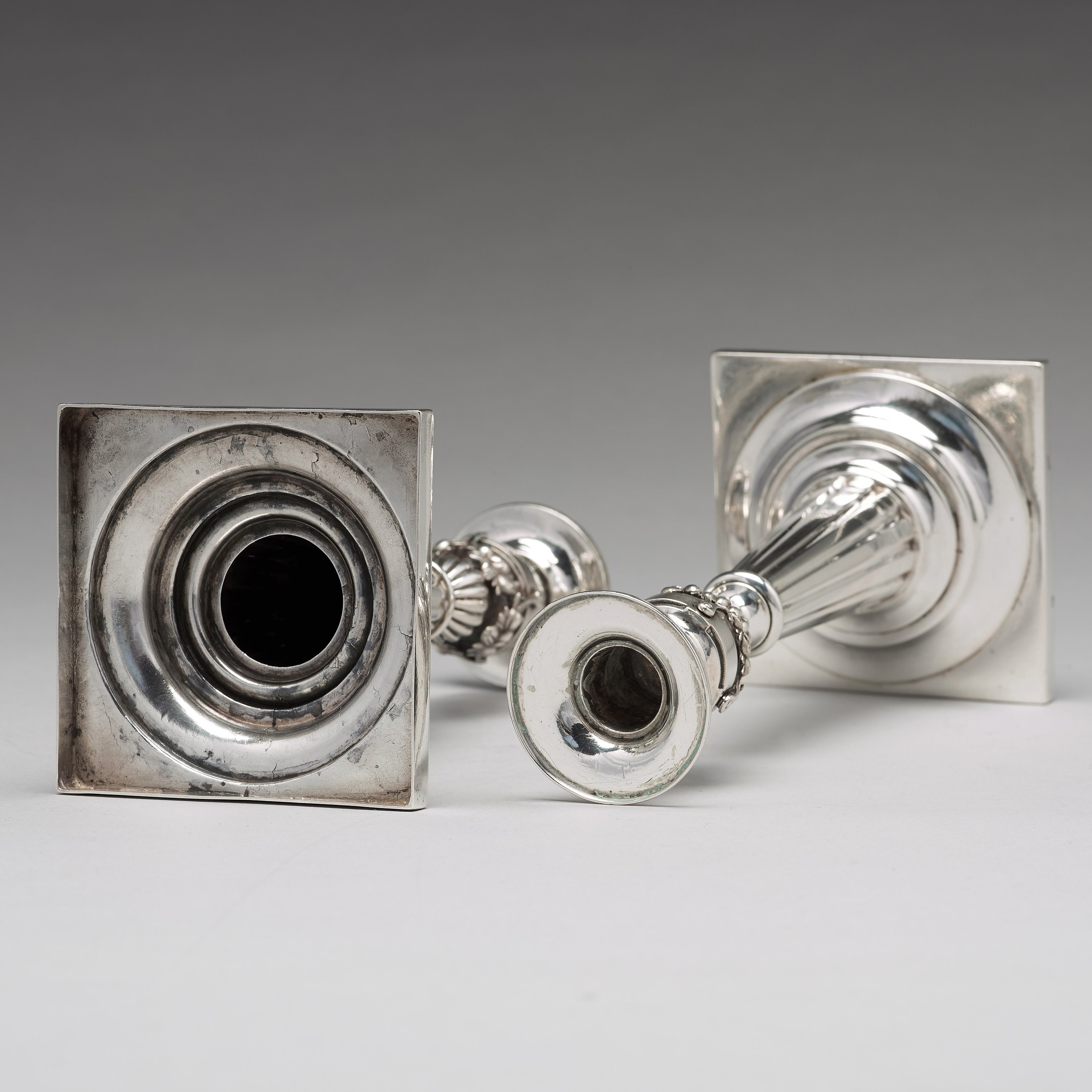 A pair of German early 19th century silver candlesticks, mark of Johann ...