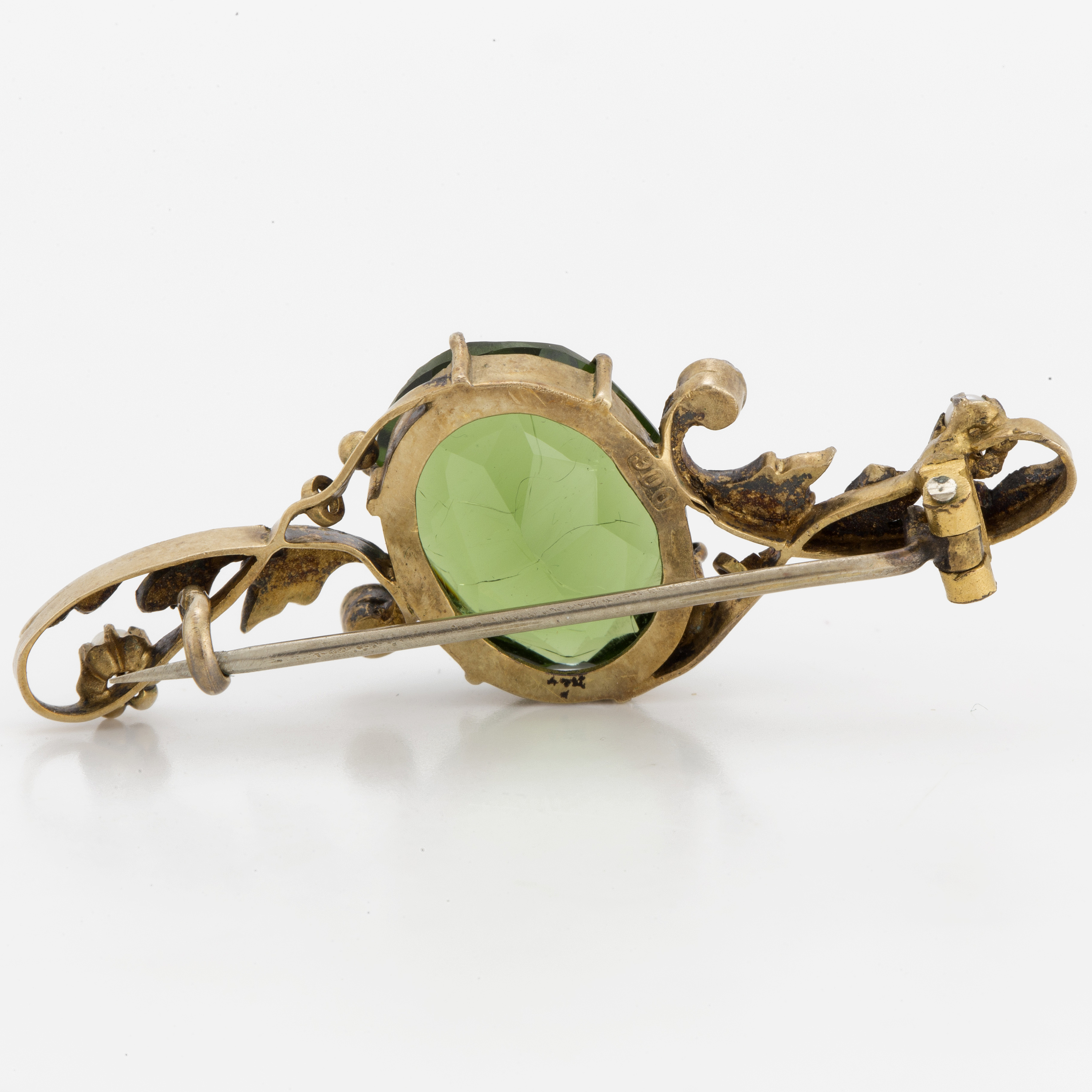 A silver and green paste stone. - Bukowskis