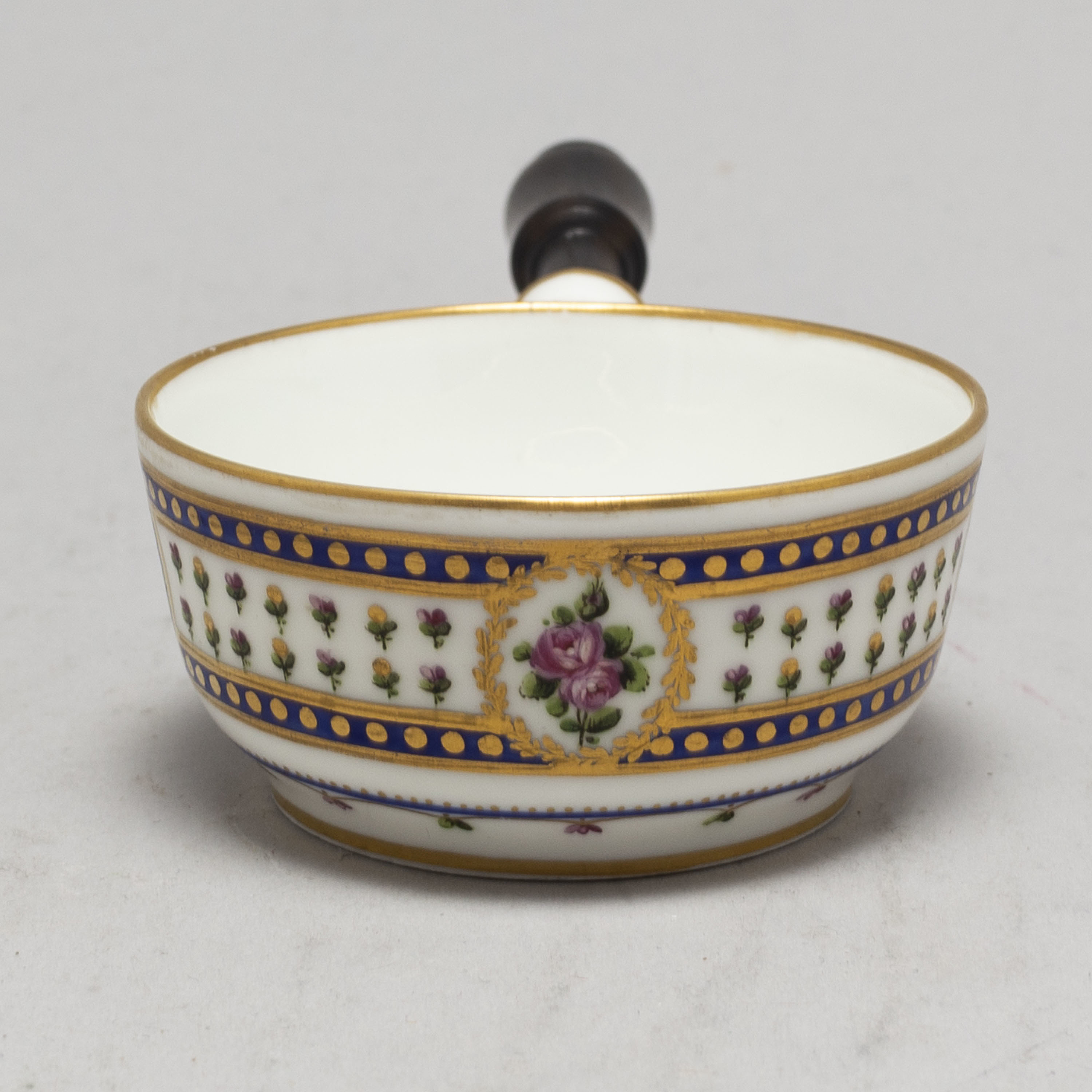 a 19th century porcelain cup with Sévrès manner mark. - Bukowskis
