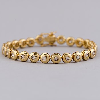 ARMBAND, briljantslipade diamanter, 14K guld. - Bukowskis