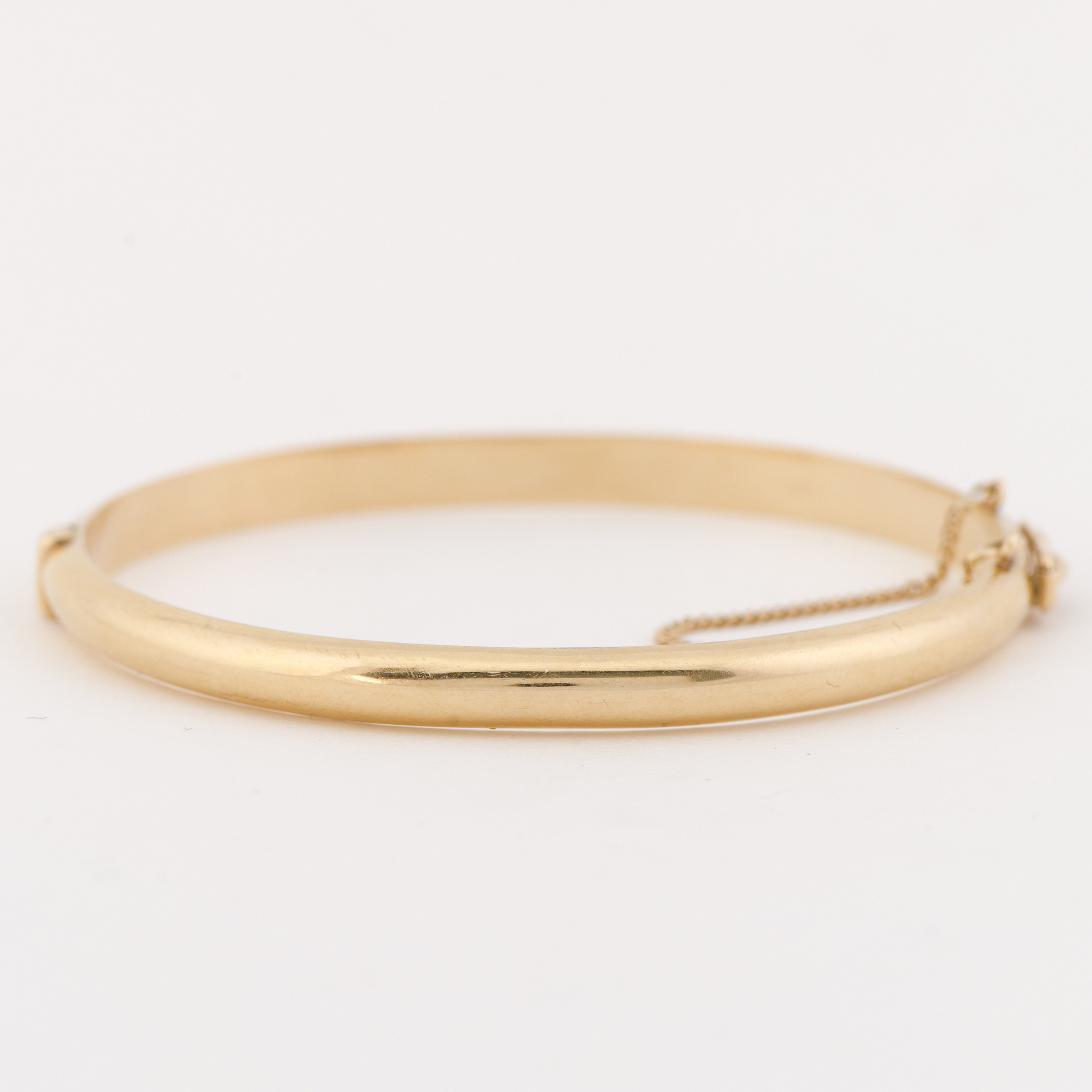 ARMRING, 14K guld. Erkki Kuusilehto, Helsinki 1974. - Bukowskis