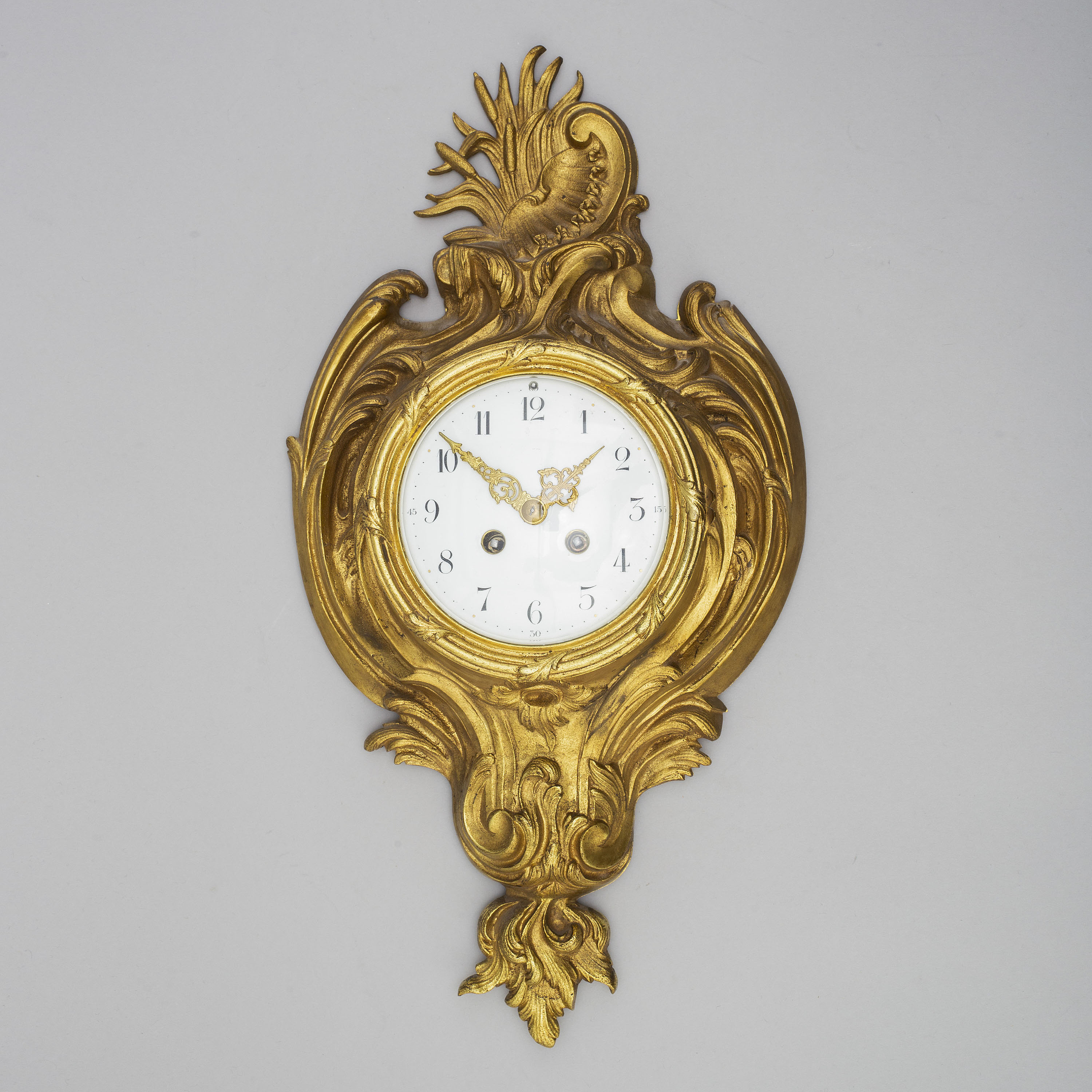 A French gilt bronze Rococo style wall clock, eraly 20th Century ...