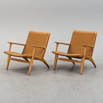 A pair of model 'CH-25' easy chairs by Hans J Wegner, Carl Hansen & Son, Odense, Denmark ...